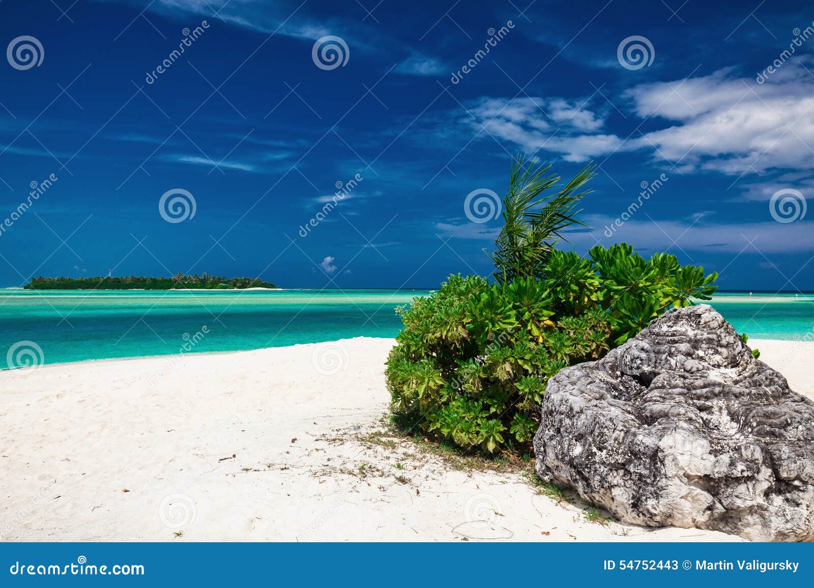 Dreamy Clear Sea with a Rock on the White Sandy Beach Stock Image ...