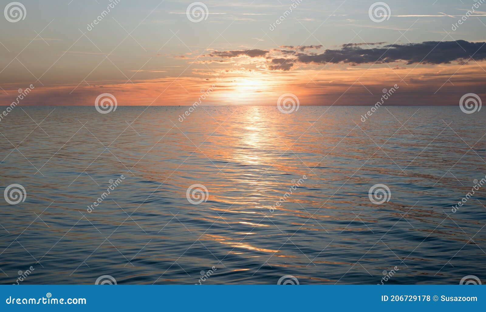 Dreamy Sunset Scenery with Sinking Sun Over the Ocean and Water ...