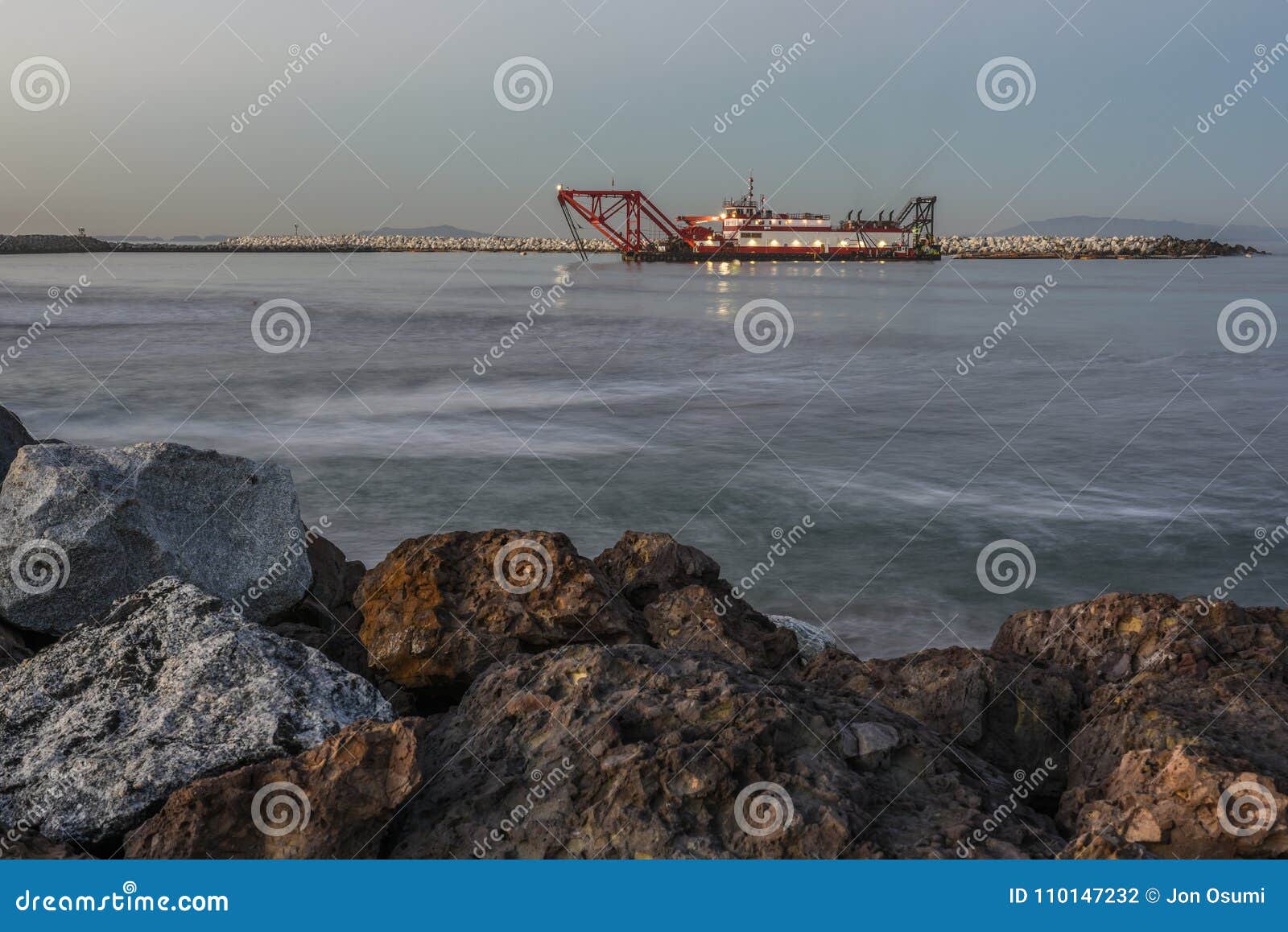 Dredge Working into the Dawn Hours in the Pacific Ocean Stock Photo ...