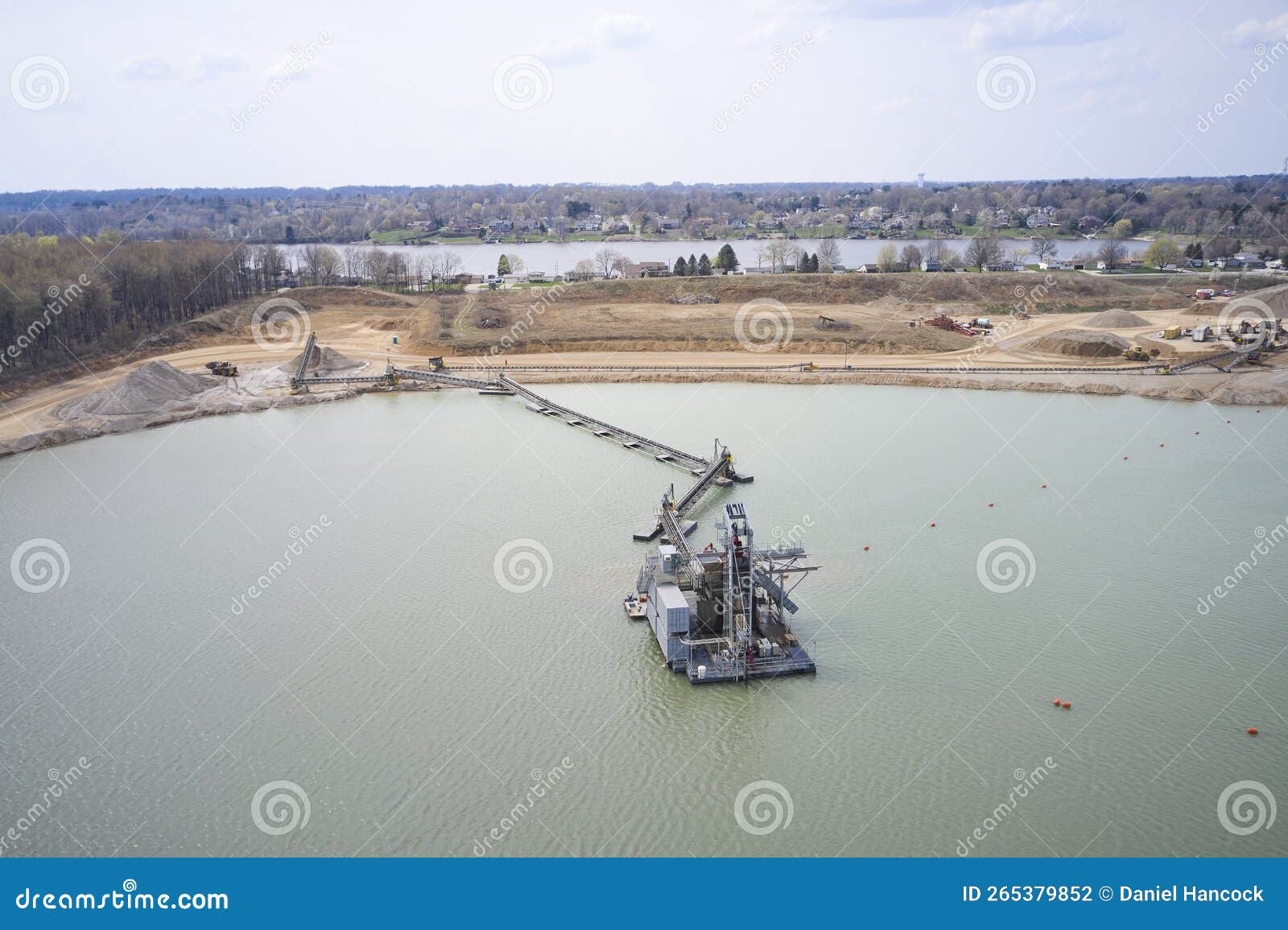 Sand dredger in a lake stock photo. Image of excavation - 265379852