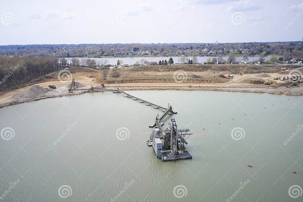 Sand dredger in a lake stock photo. Image of excavation - 265379852