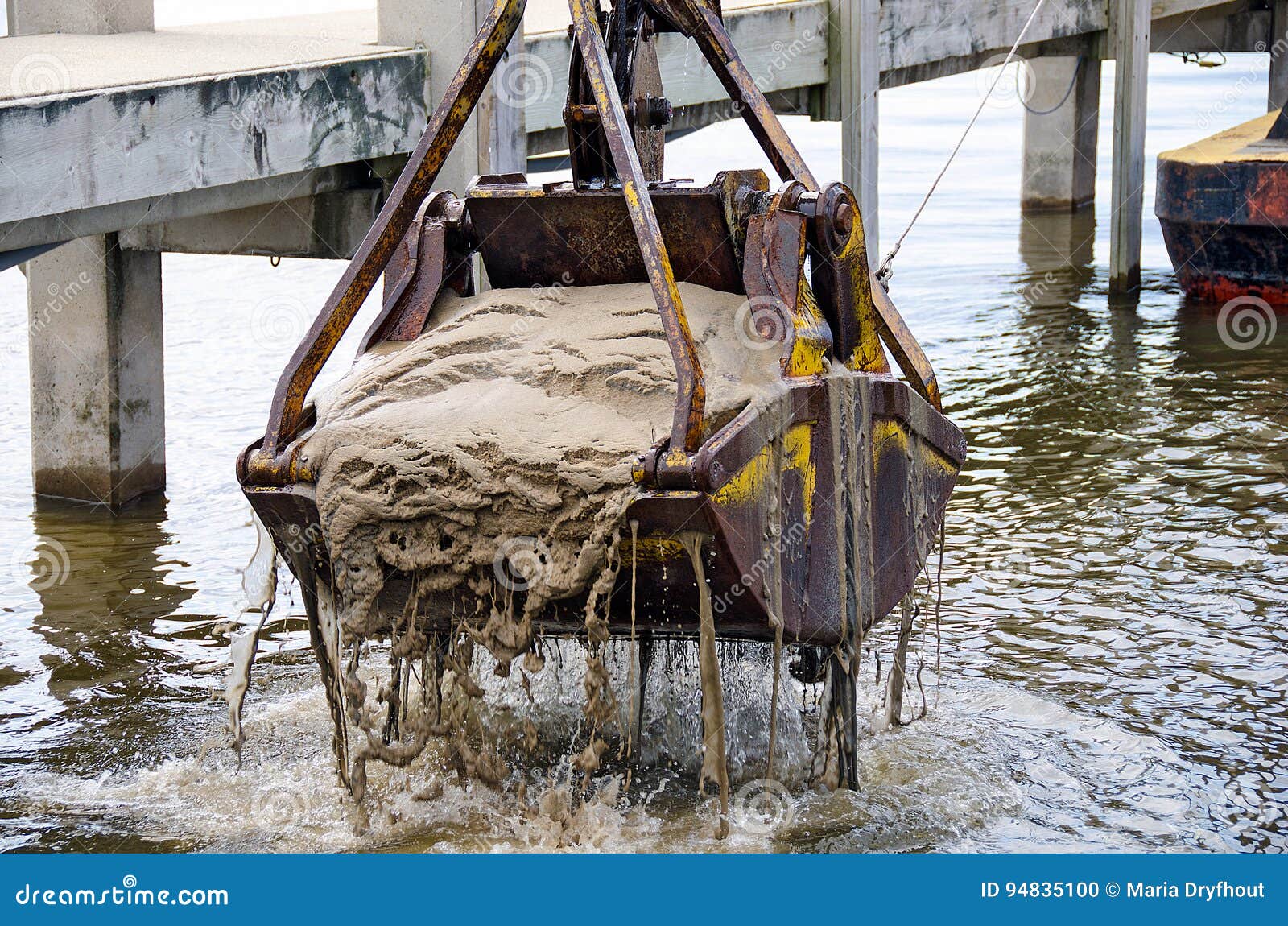 Dredging Bucket in Lake Marina Stock Photo - Image of sandy, machinery ...