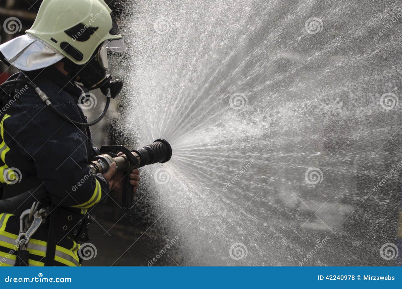 Drenched Firefighter stock photo. Image of group, team - 42240978