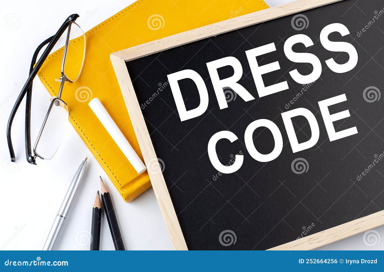 DRESS CODE Text on the Blackboard with Notepad , Pen, Pencil Stock ...
