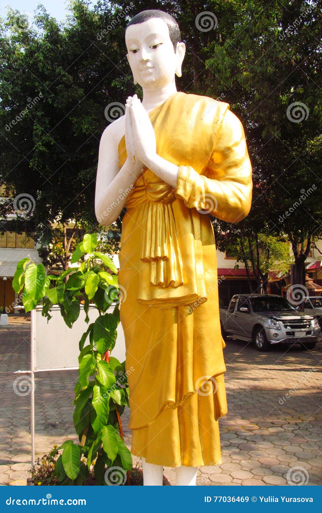 Dressed in Yellow Buddha Statue Stock Image - Image of asian, buddha ...