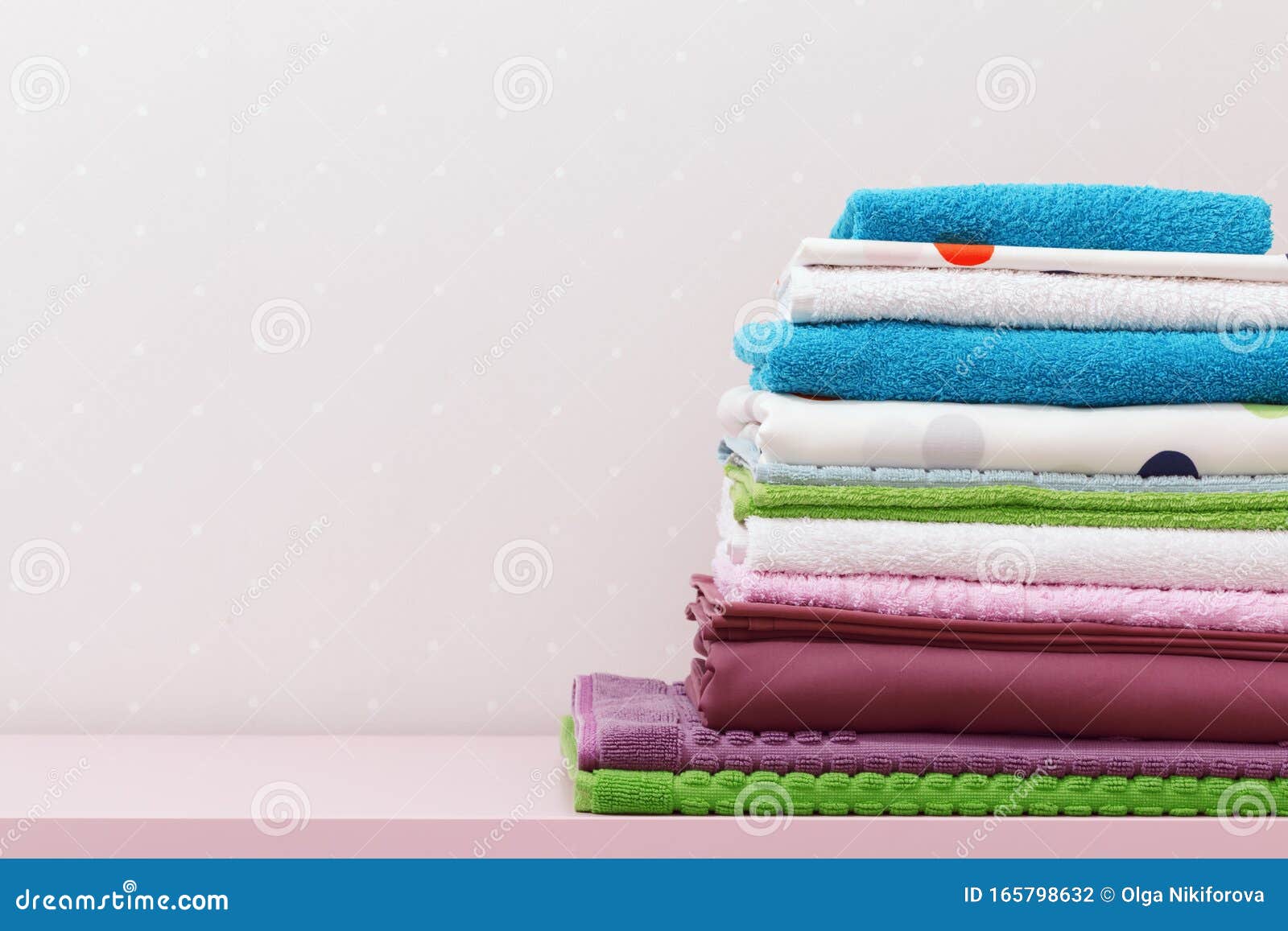 On the Dresser There is a Stack of Clean Ironed Bed Linen and Folded ...