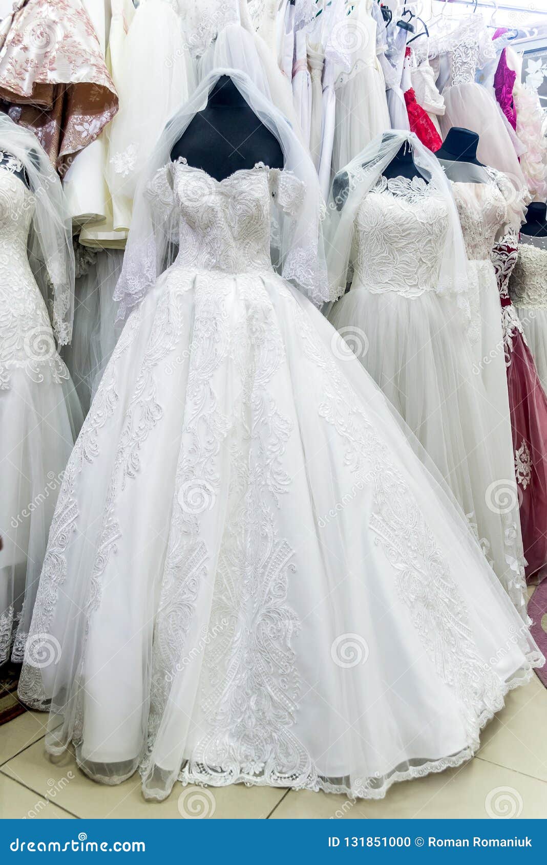 Dresses for Bride in Wedding Salon on Mannequins Stock Photo - Image of ...