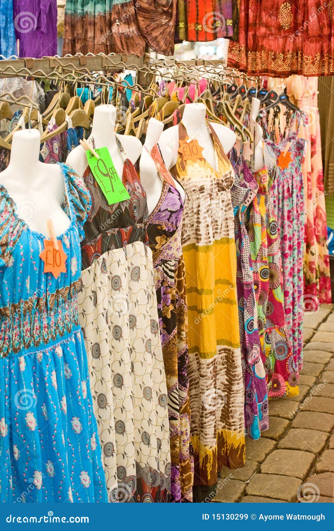 Dresses on market stall. stock image. Image of color - 15130299