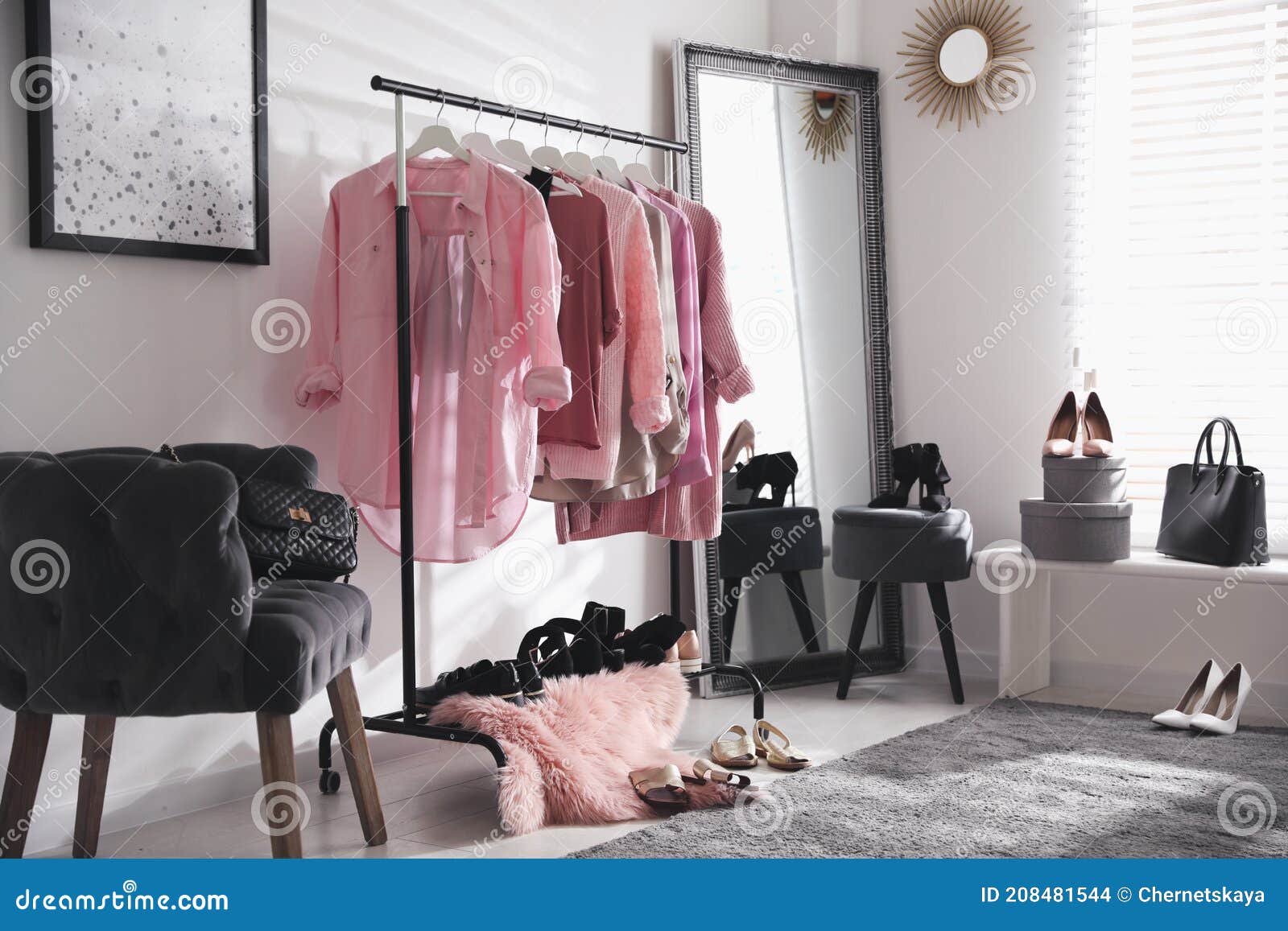Dressing Room Interior with Clothing Rack and Comfortable Chair Stock ...