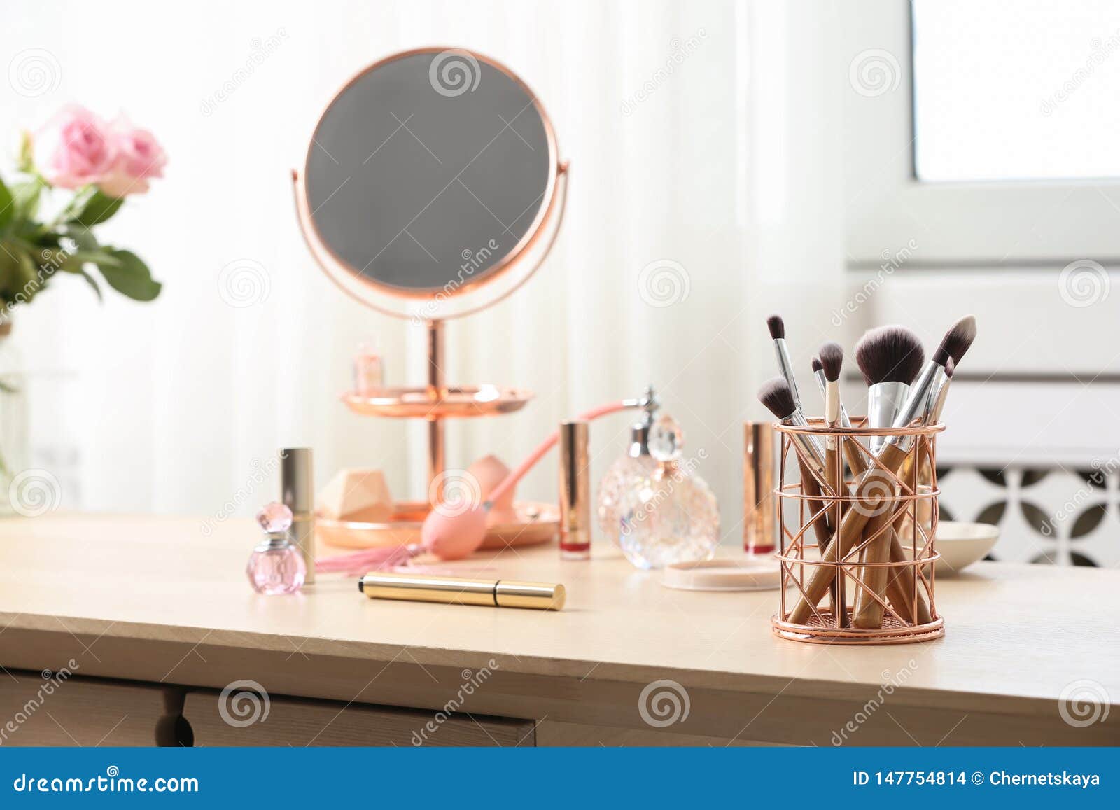 Dressing Table with Different Makeup Products and Accessories Stock ...