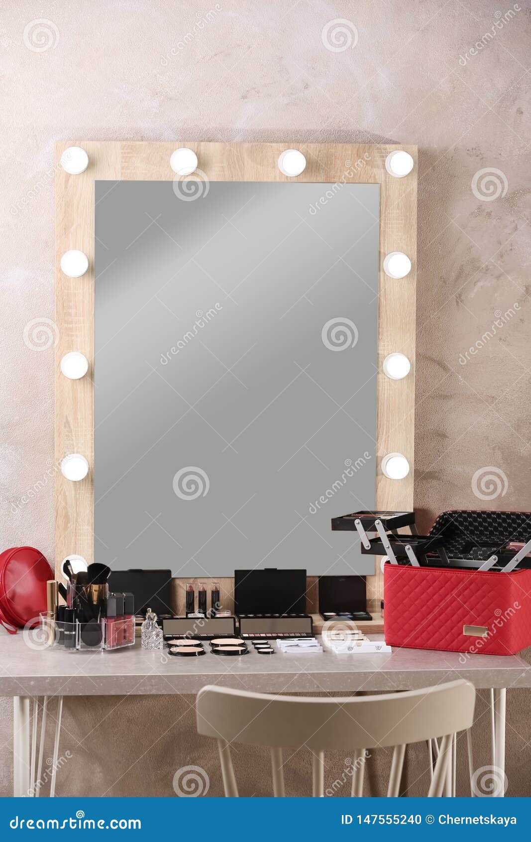 Dressing Table with Different Makeup Products and Accessories Stock ...