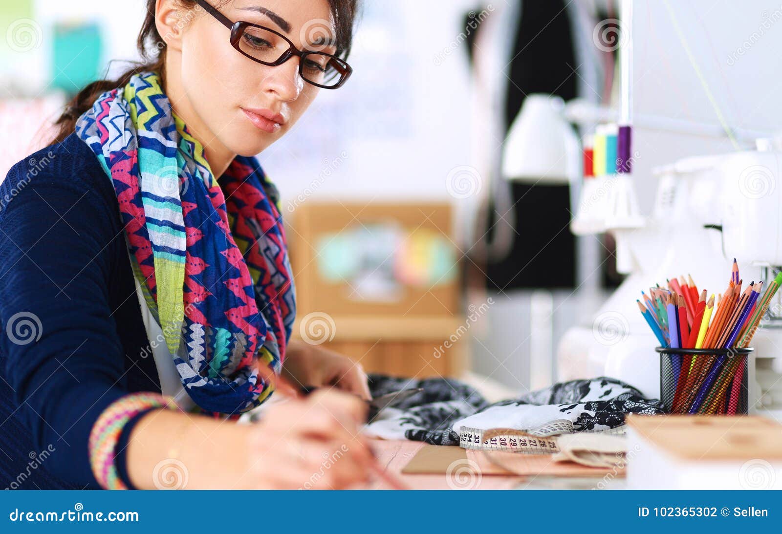 Dressmaker Designing Clothes Pattern on Paper Stock Photo - Image of ...
