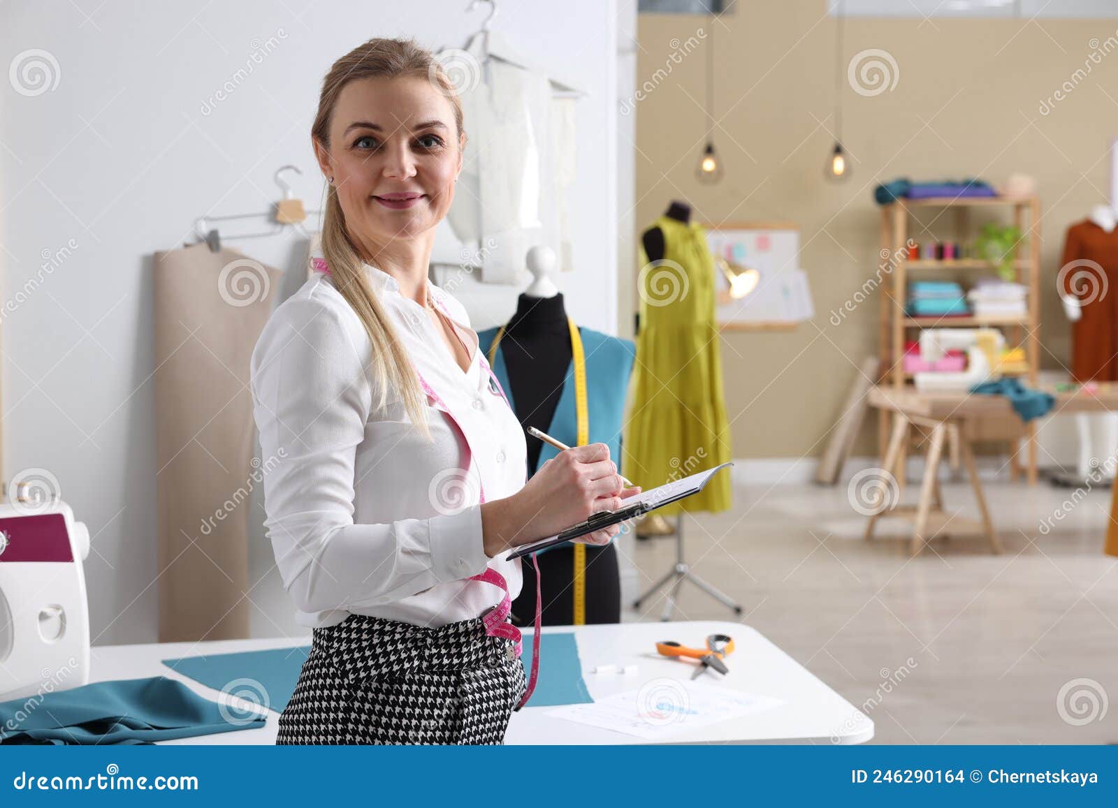 Dressmaker Drawing Sketch of Garment in Workshop Stock Photo - Image of ...