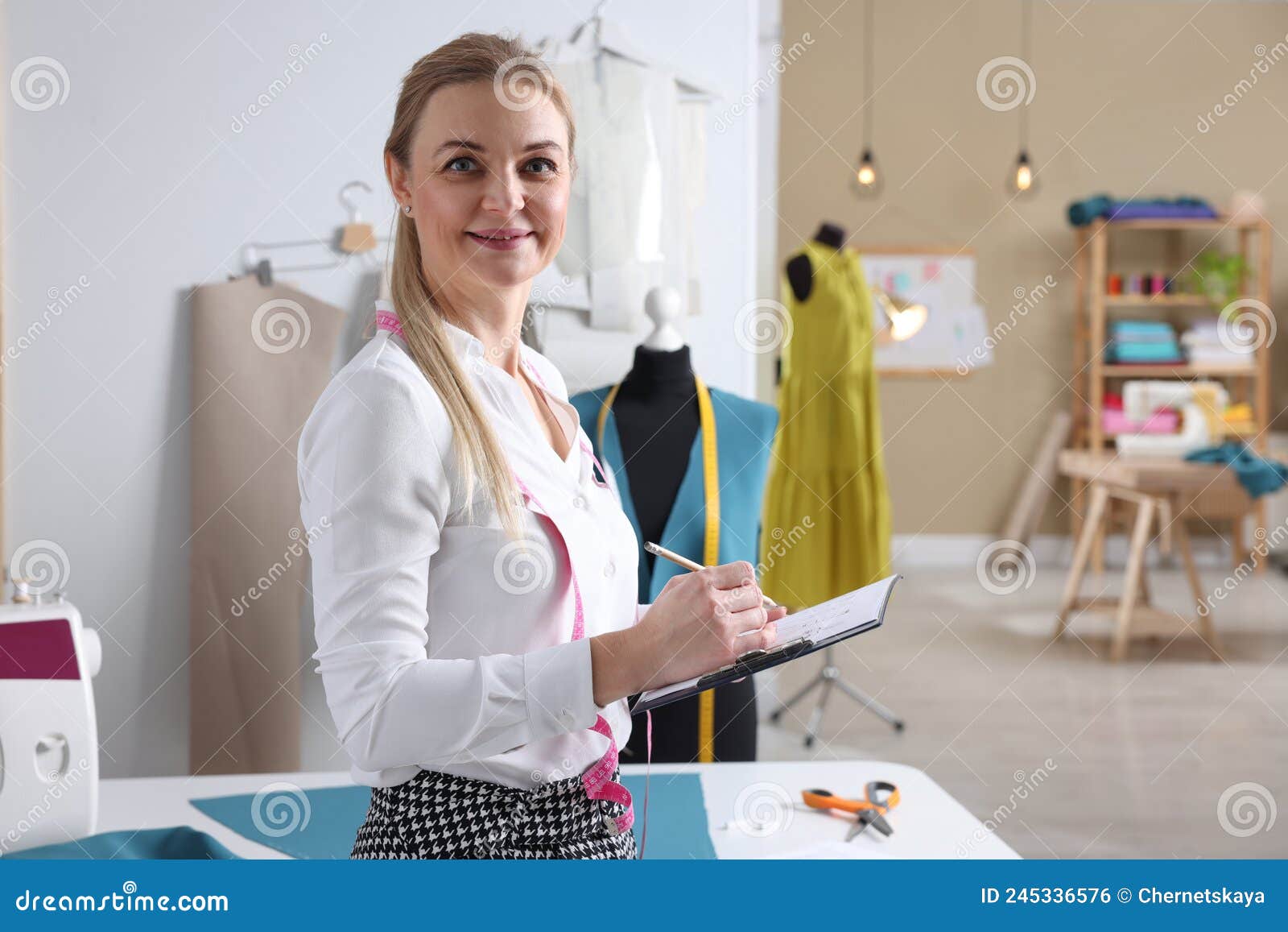 Dressmaker Drawing Sketch of Garment in Workshop, Space for Text Stock ...