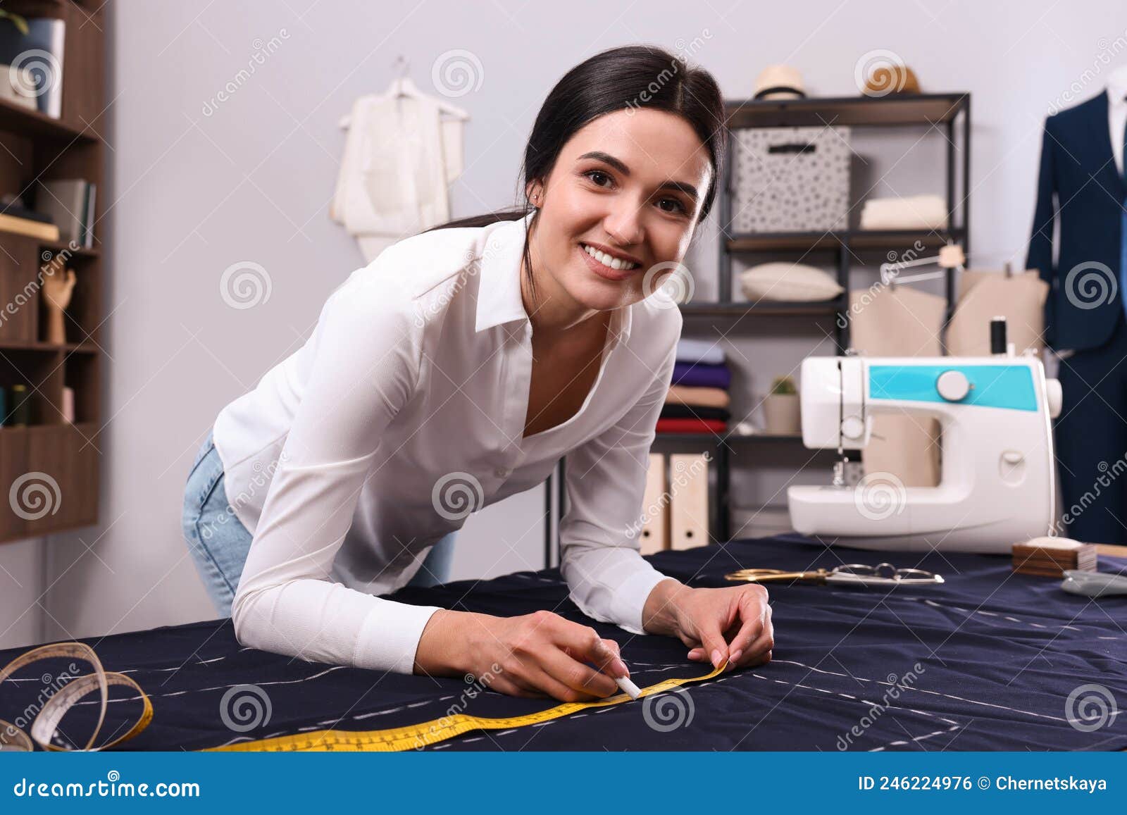 Dressmaker Marking Fabric with Chalk in Workshop Stock Photo - Image of ...
