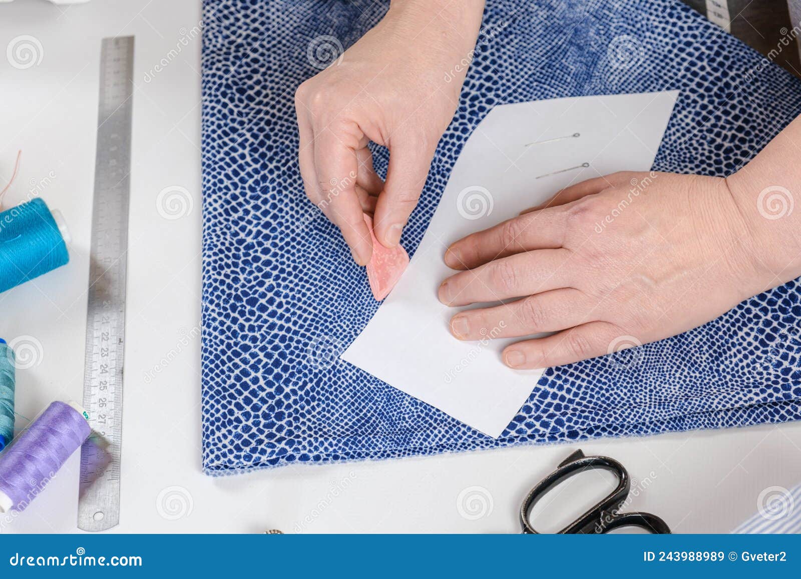Dressmaker Marks a Piece of Clothing on a Fabric with a Chalk According ...
