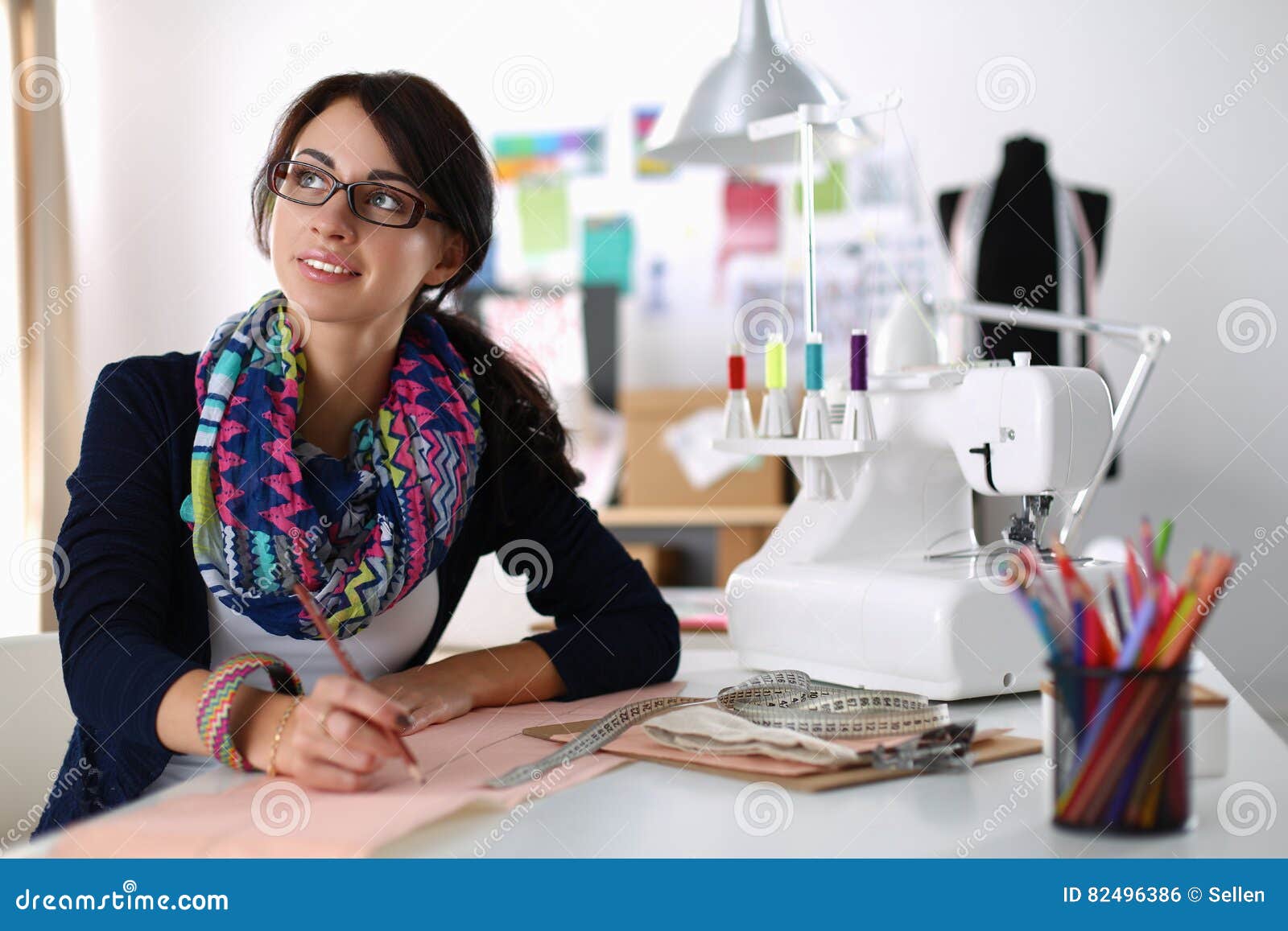 Dressmaker Woman Designing Clothes Pattern on Paper Stock Photo - Image ...