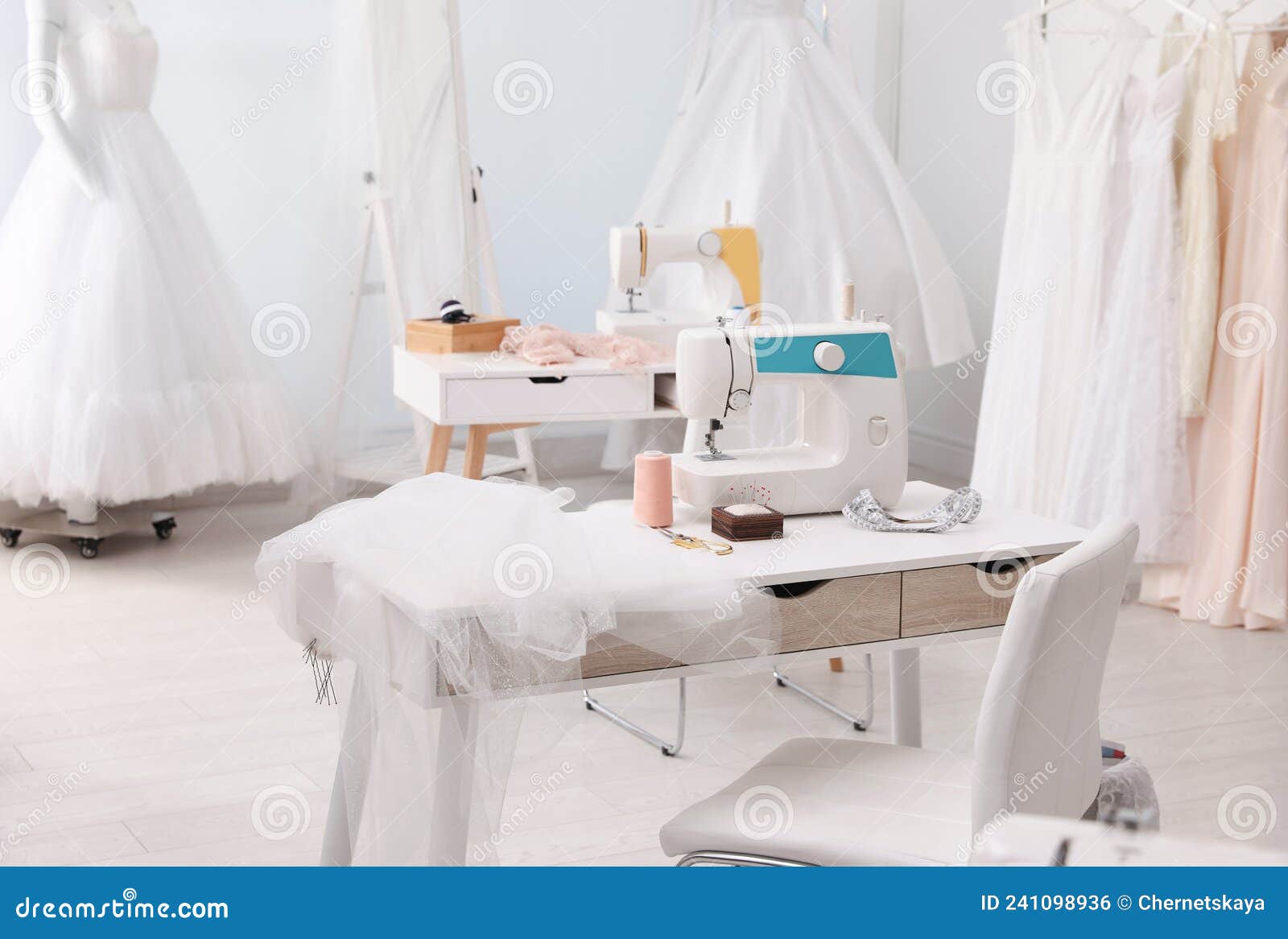 Dressmaking Workshop Interior with Wedding Dresses and Equipment Stock ...