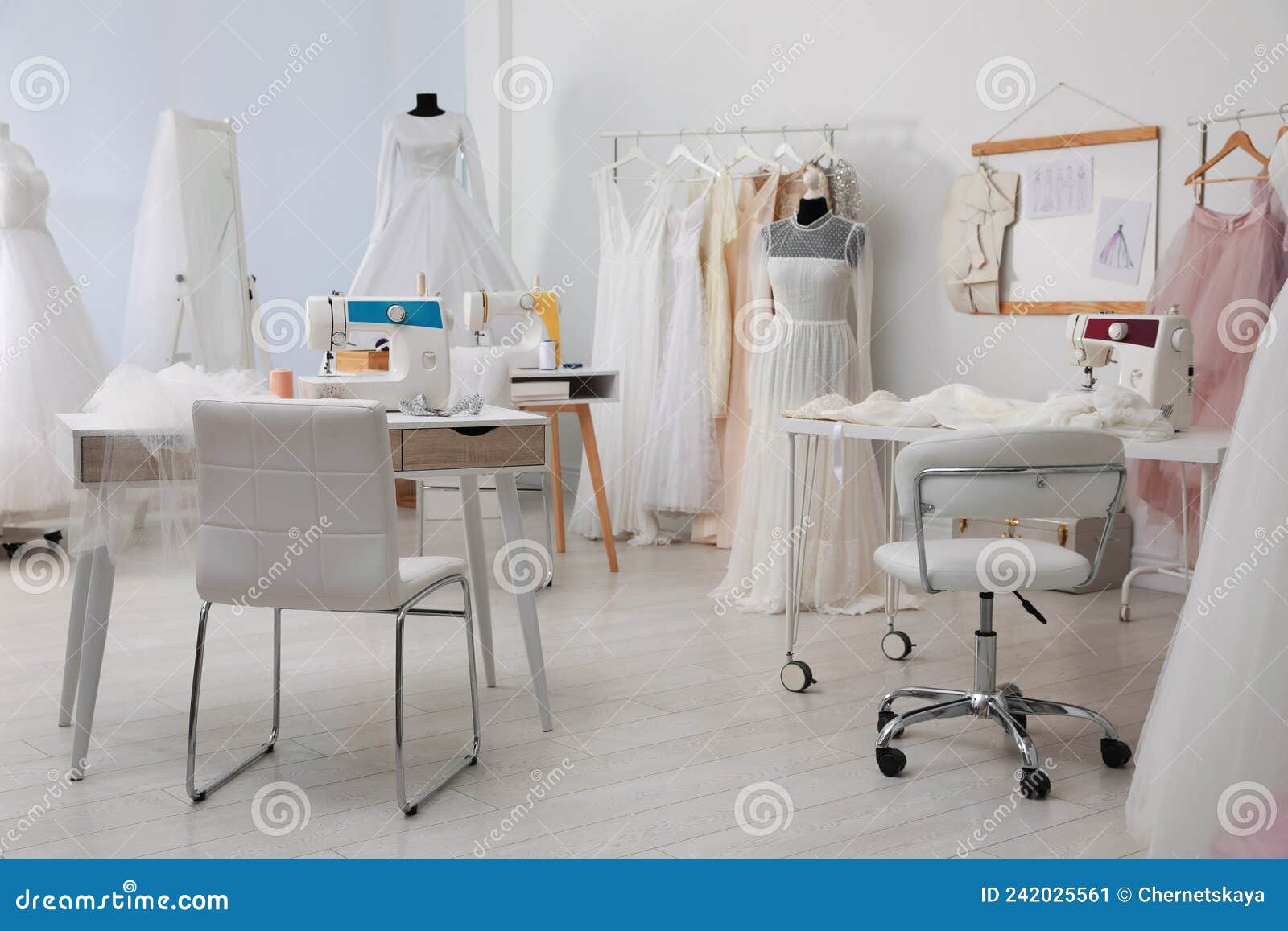 Dressmaking Workshop Interior with Wedding Dresses and Equipment Stock ...
