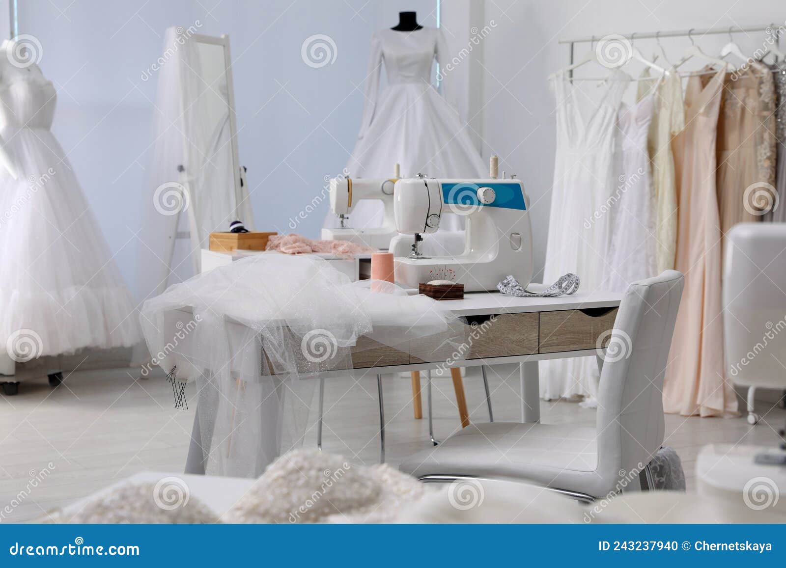 Dressmaking Workshop with Wedding Dresses and Equipment Stock Photo ...