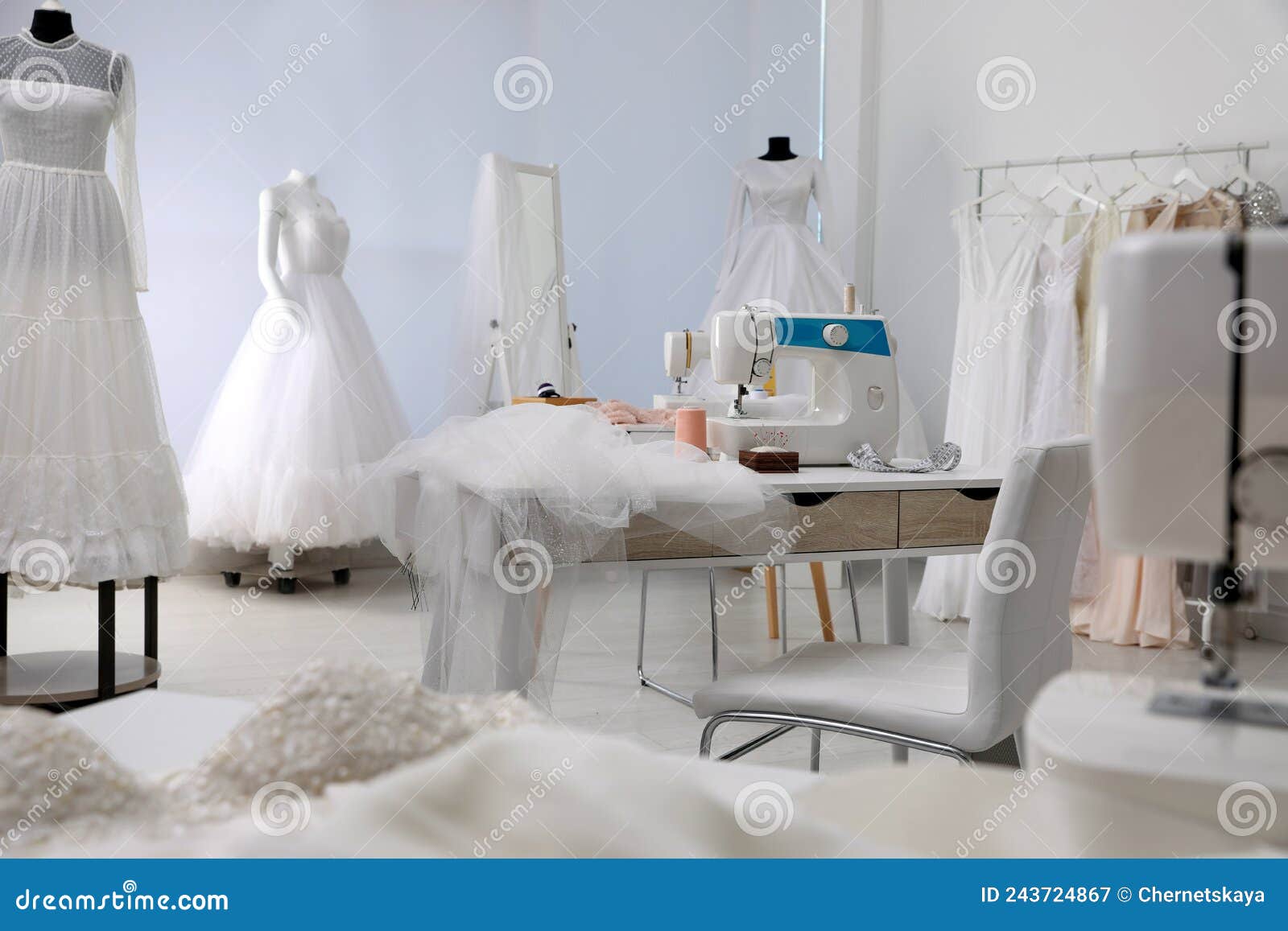 Dressmaking Workshop Interior with Wedding Dresses and Equipment Stock ...