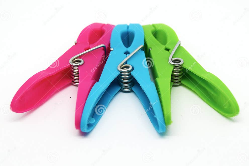 Drie plastic pinnen stock afbeelding. Image of linnen - 91796075