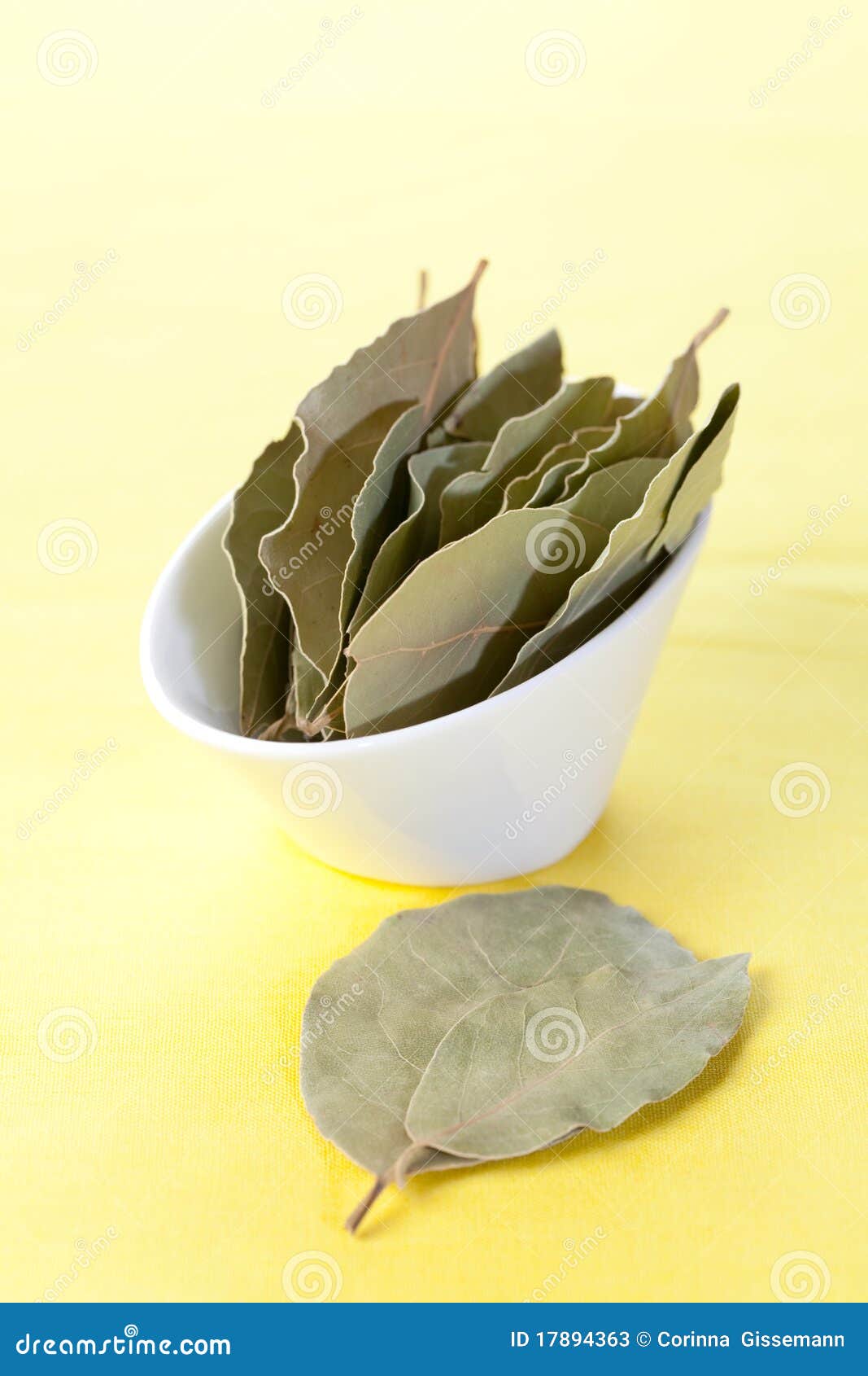 Dried bay leaves in a bowl stock image. Image of condiment - 17894363