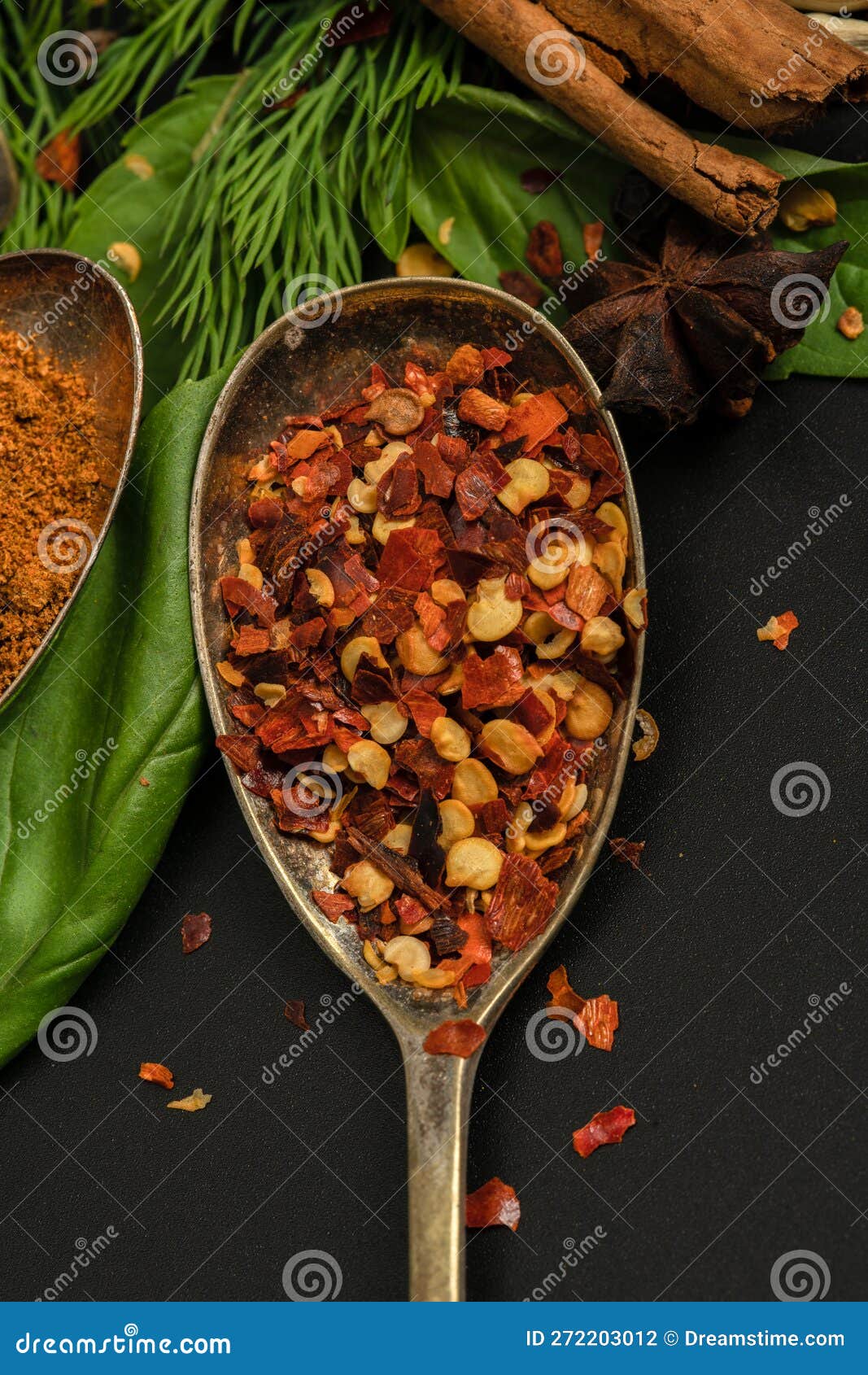 Dried Chilli Flakes on a Spoon Stock Photo - Image of seed, table ...