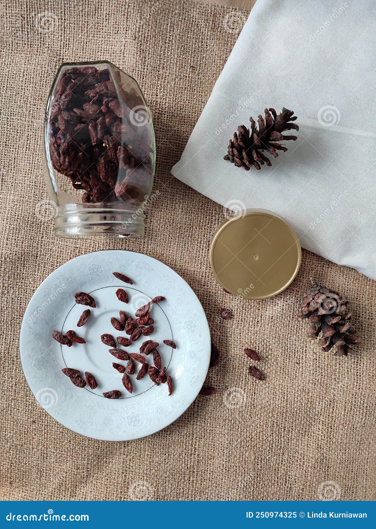 Dried Chinese Goji Berry or Kichi in Chinese on the Rustic Table. Stock ...