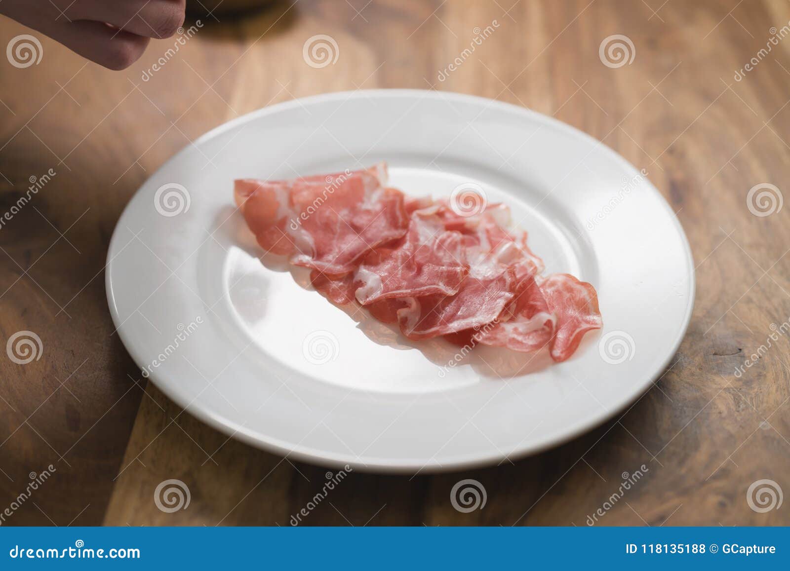 Dried Coppa Ham on White Plate Stock Photo - Image of coppa, baked ...
