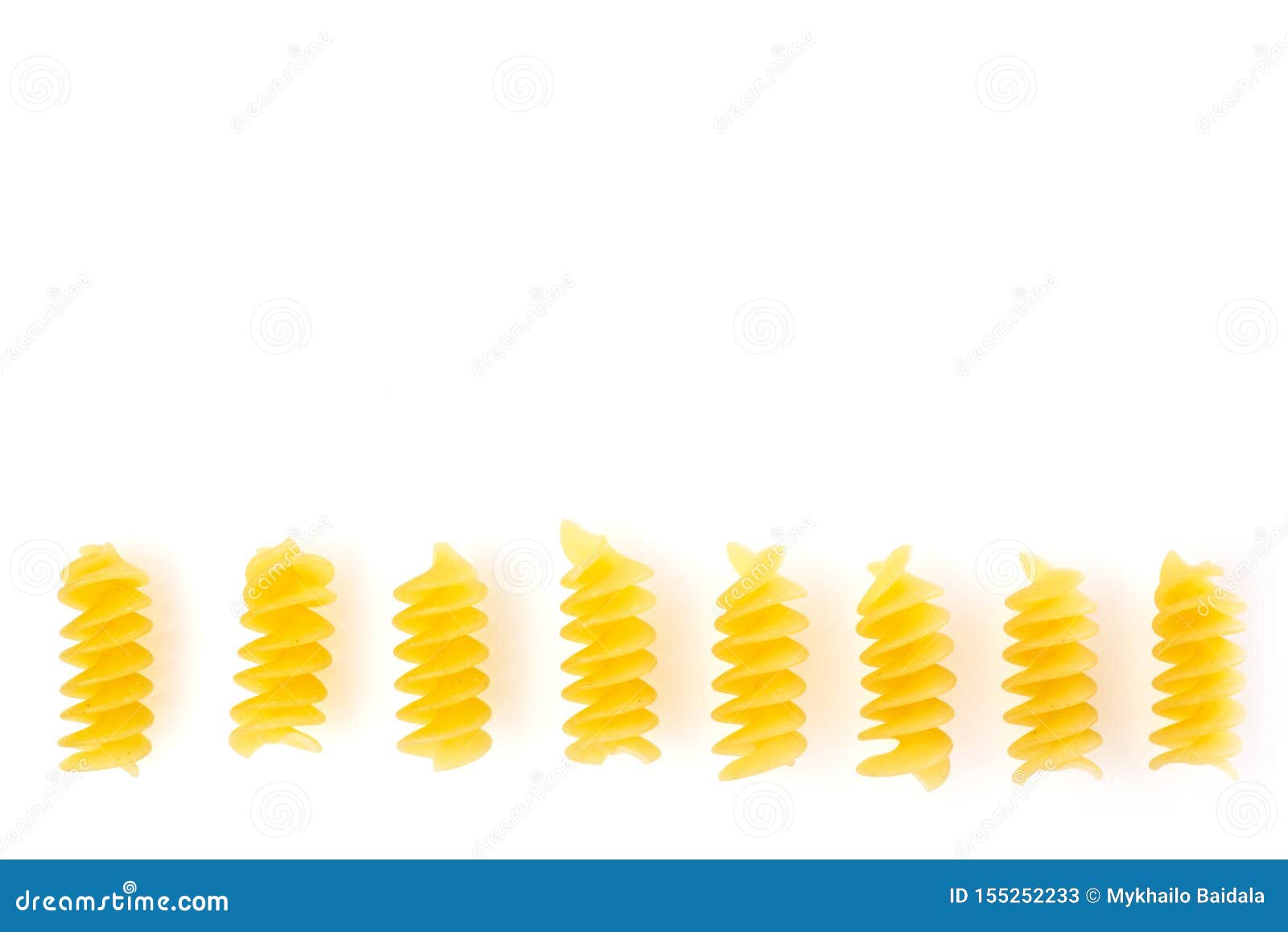 Dried Corkscrew Shaped Pasta or Fusilli Pasta Over White Background ...