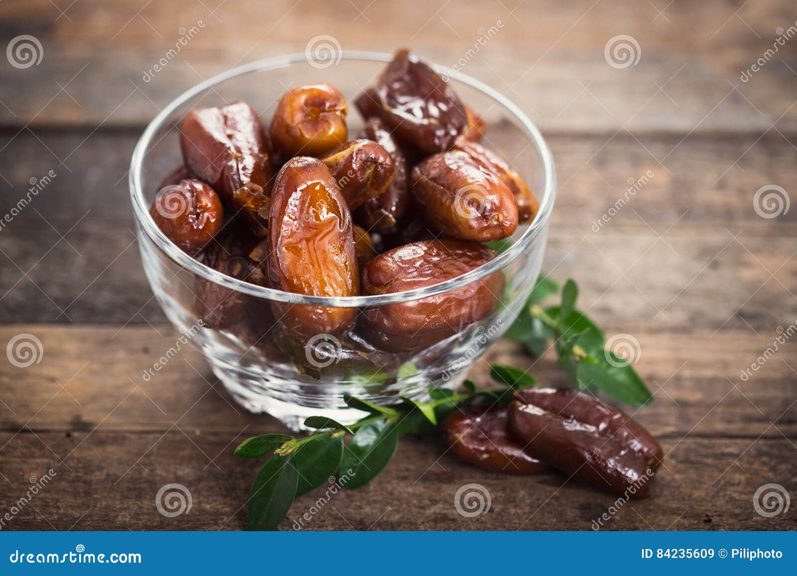 Dried dates in the bowl stock image. Image of fruit, closeup - 84235609