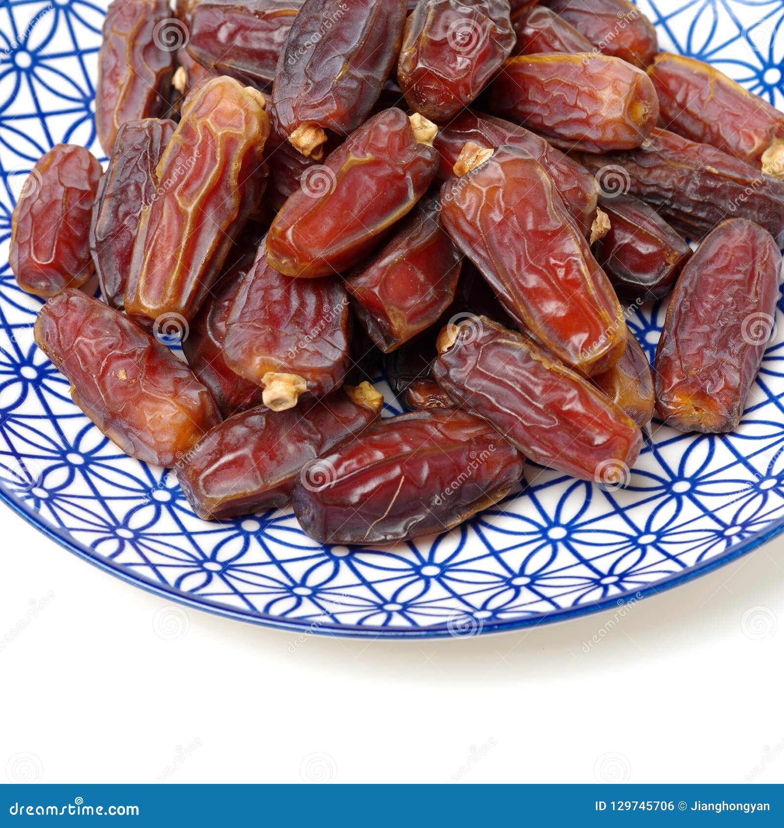 Dried dates stock photo. Image of plate, meal, healthy - 129745706