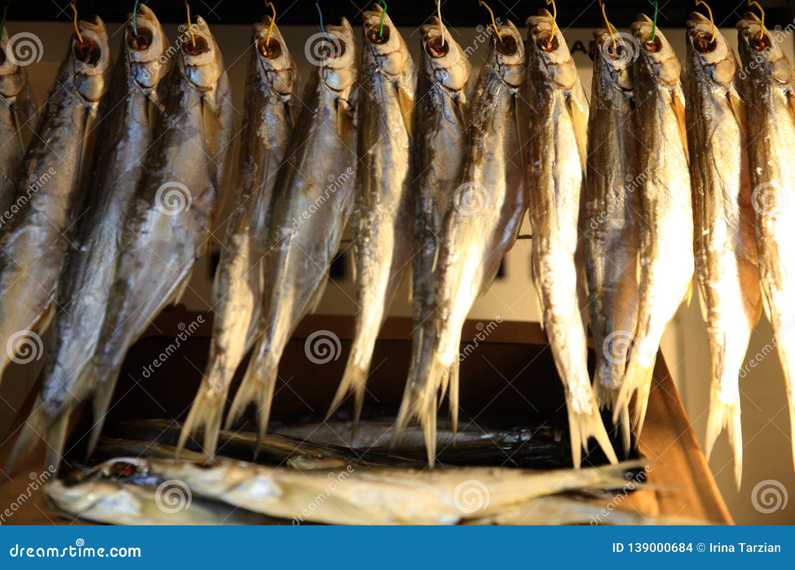 Dried Fish Hanging on Hooks Stock Photo - Image of seafood, meat: 139000684