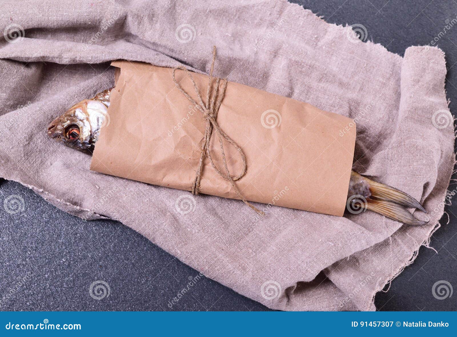 Dried Fish Roach Wrapped in Brown Craft Paper Stock Image - Image of ...