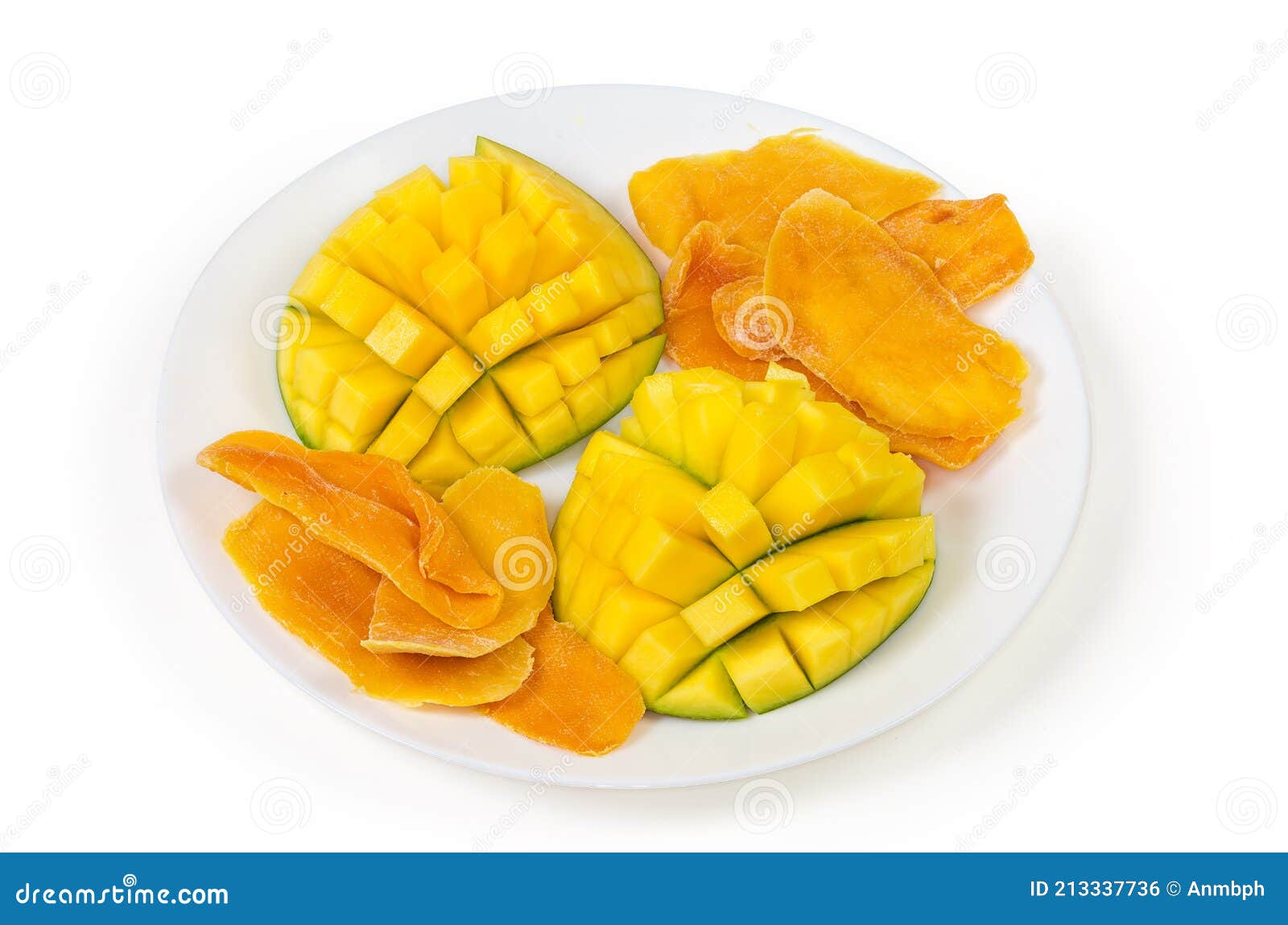 Dried Mango Slices and Fresh Cut Mango Halves on Dish Stock Photo ...