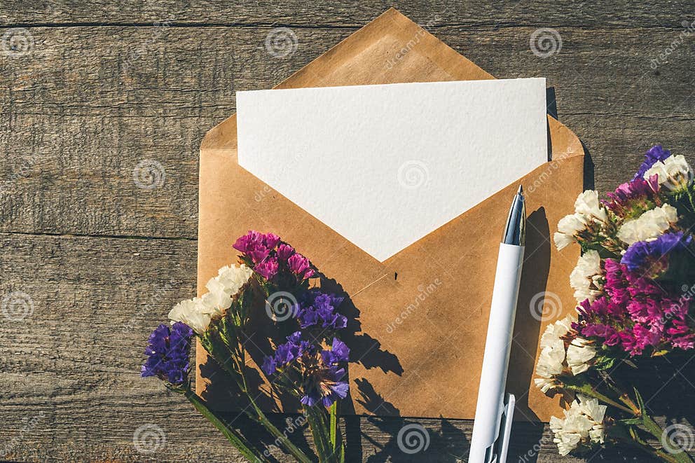 Static Flowers and an Envelope with an Empty Postcard. Stock Photo ...