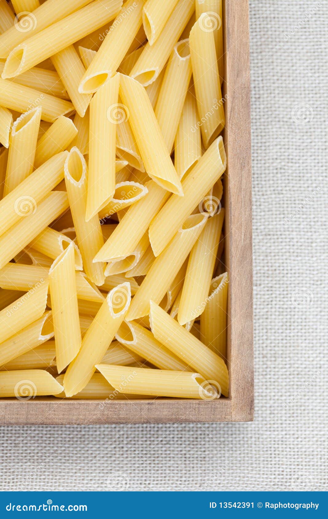 Dried Pasta in a Wooden Box Stock Image - Image of carbs, closeup: 13542391
