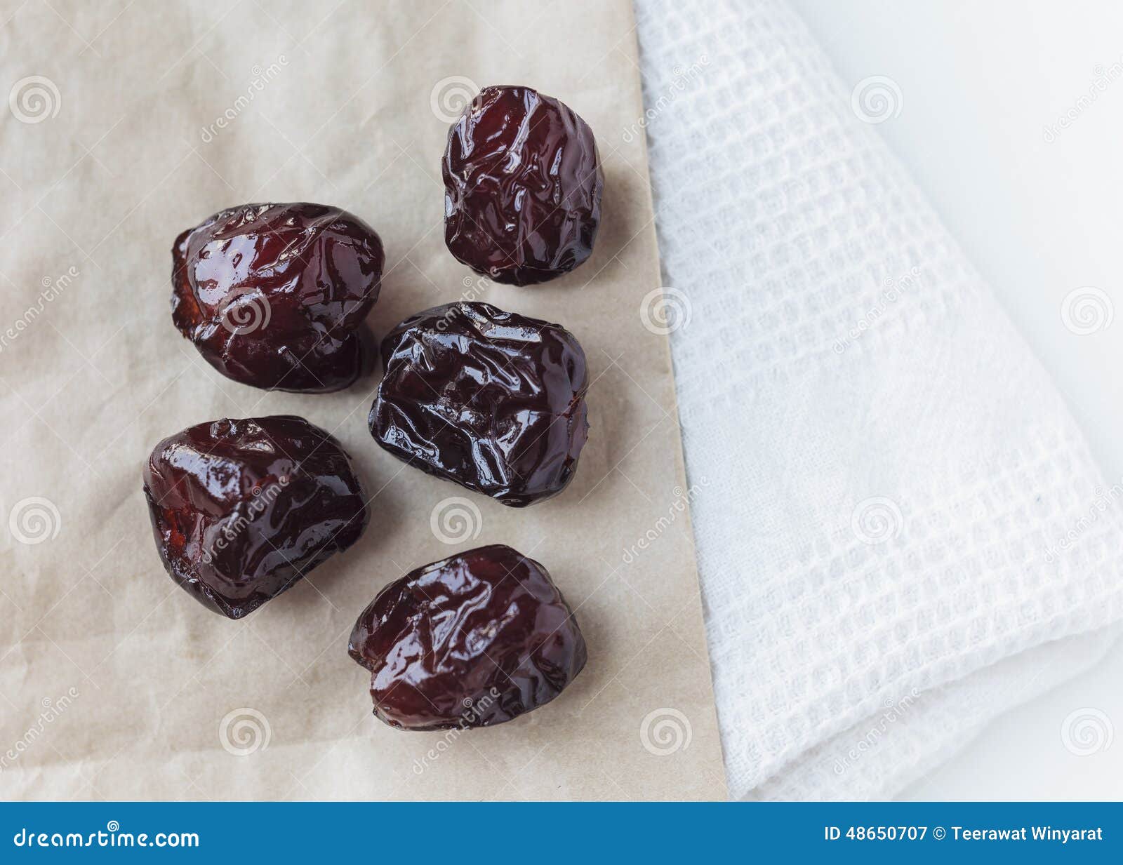 Dried prune on paper bag stock image. Image of snack - 48650707