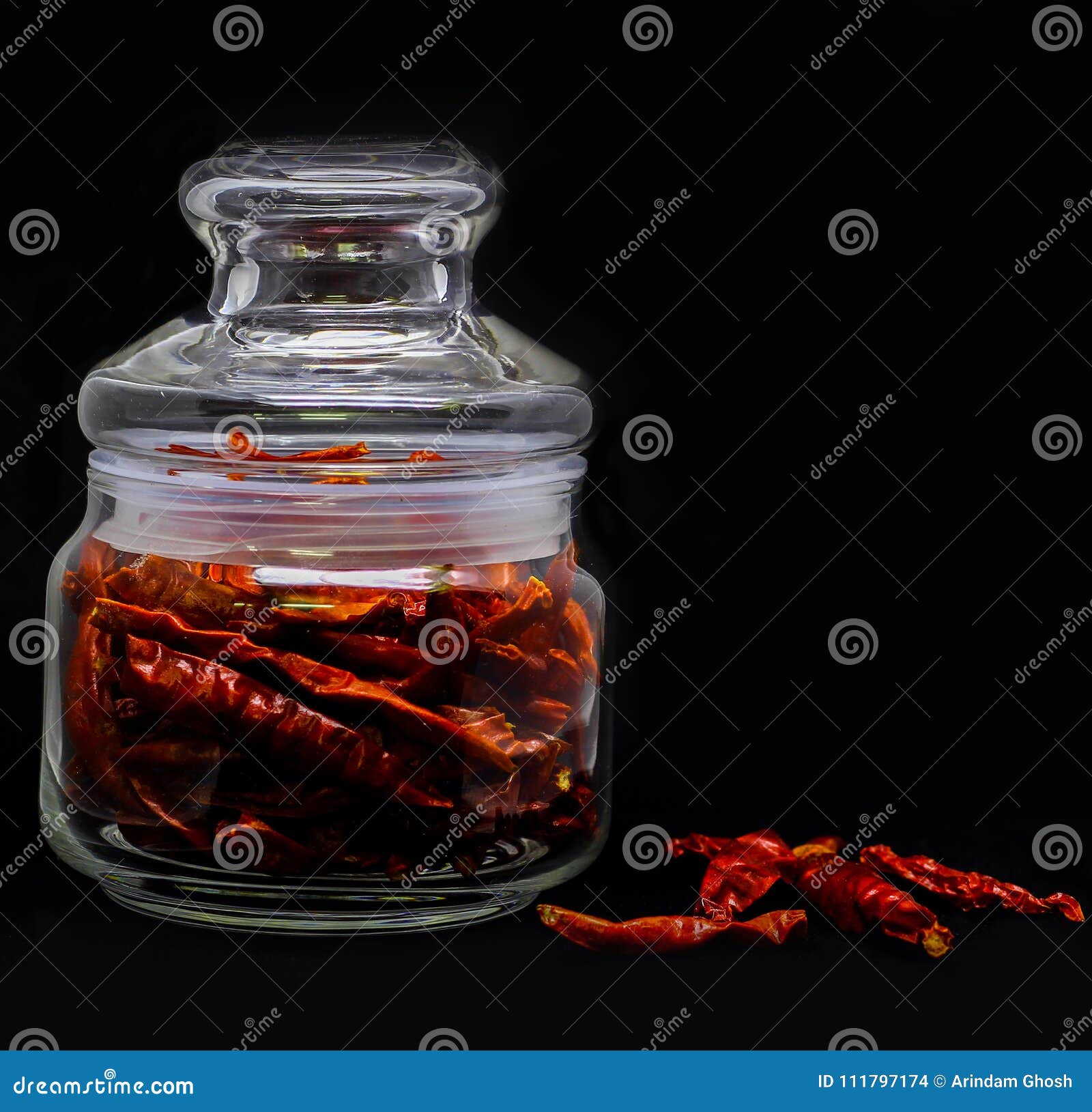 Dried Red Chilli in Glass Container in Black Background Stock Photo ...