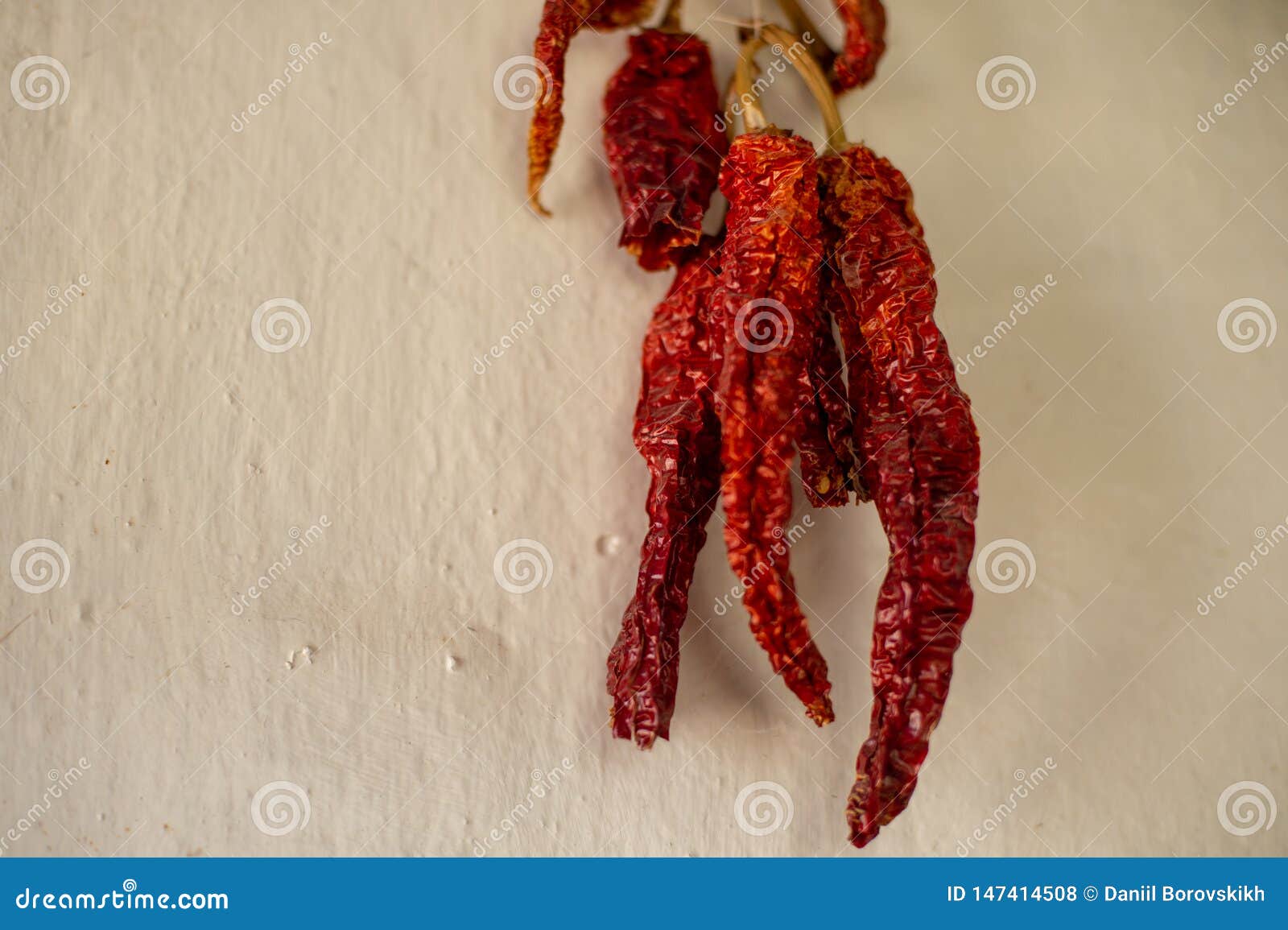 Dried Red Pepper in a Bundle on the Wall Stock Photo - Image of natural ...