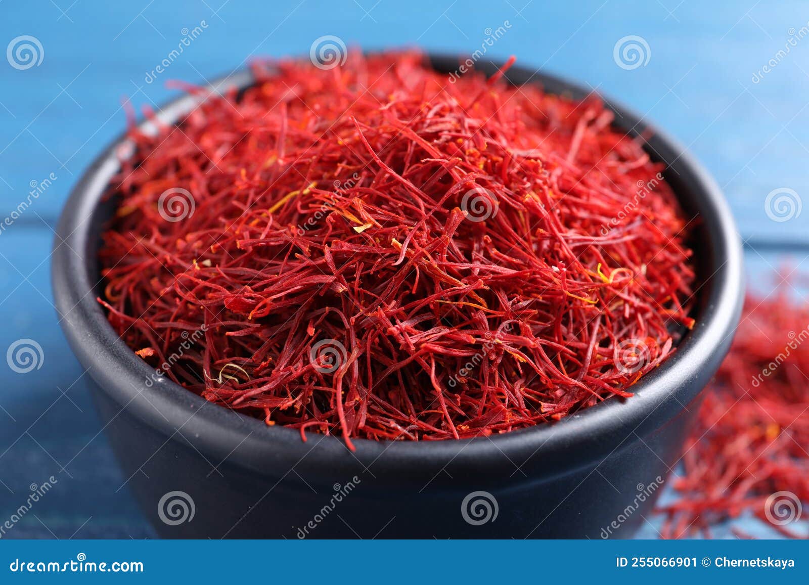 Dried Saffron in Bowl on Blue Table Stock Image - Image of harvest ...
