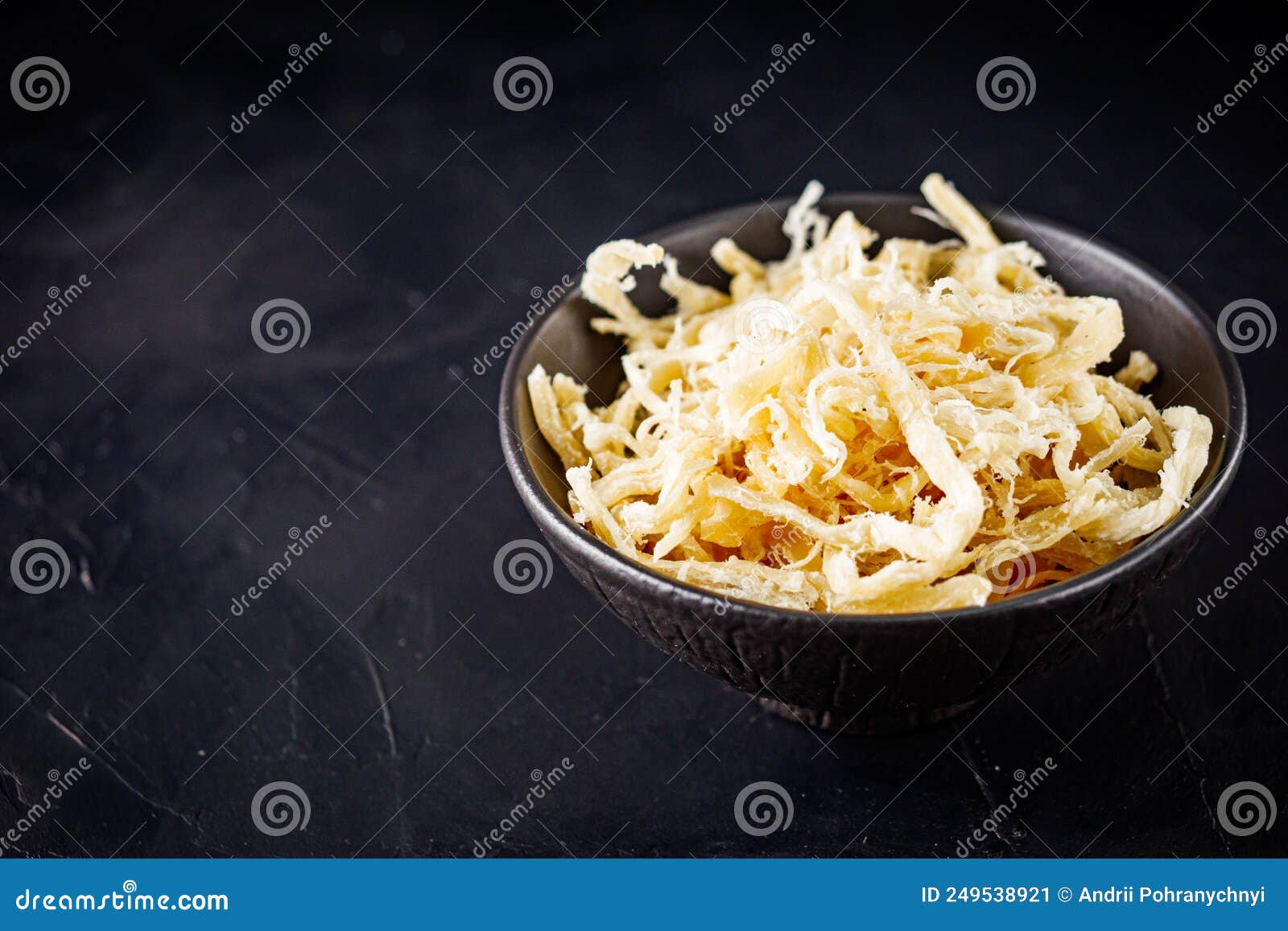 Dried Squid Meat on a Dark Stone Background Stock Image - Image of food ...