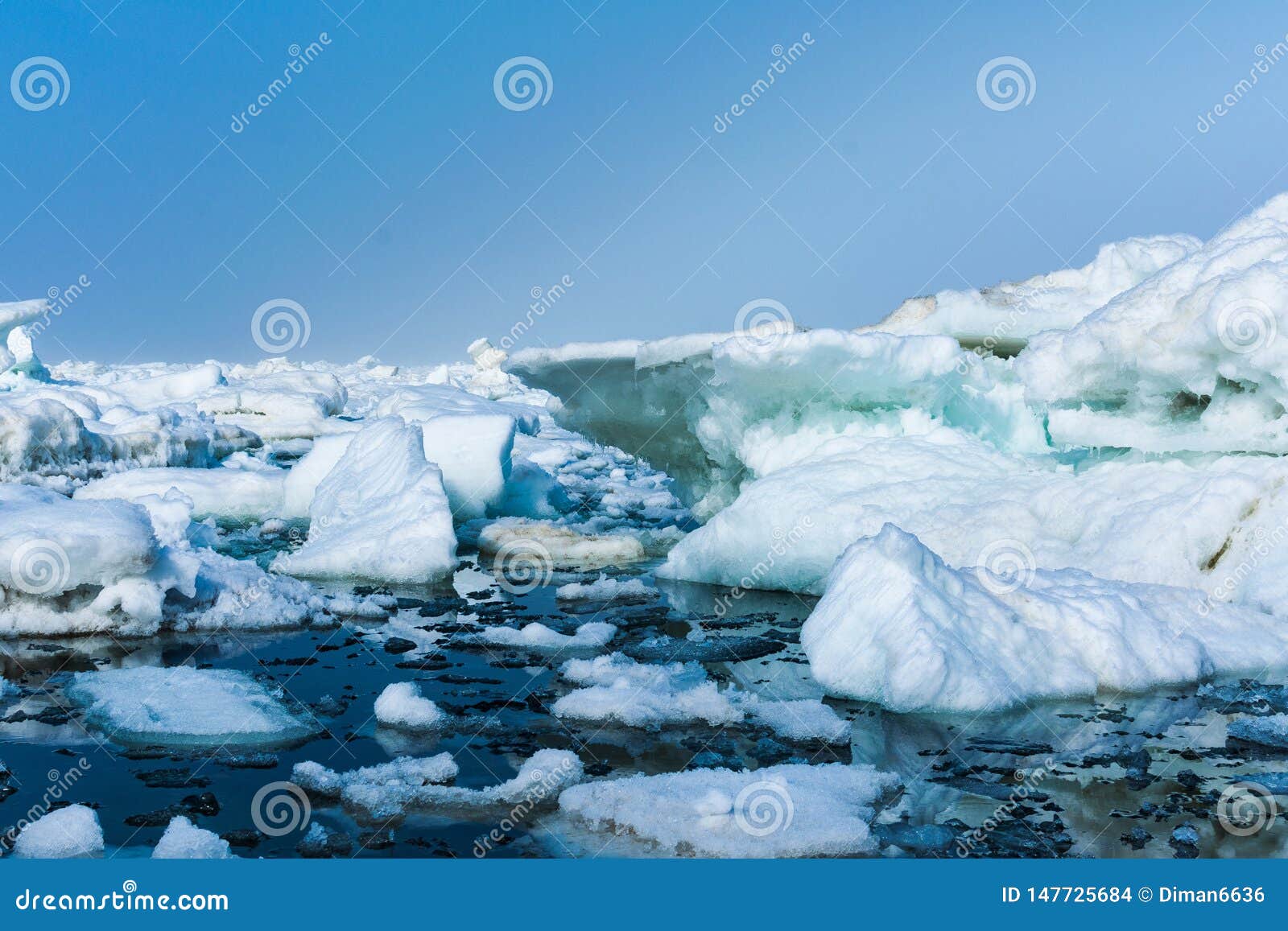 Drifting Ice in the Sea Near the Sandy Coast. Ice in the Sea Near the ...