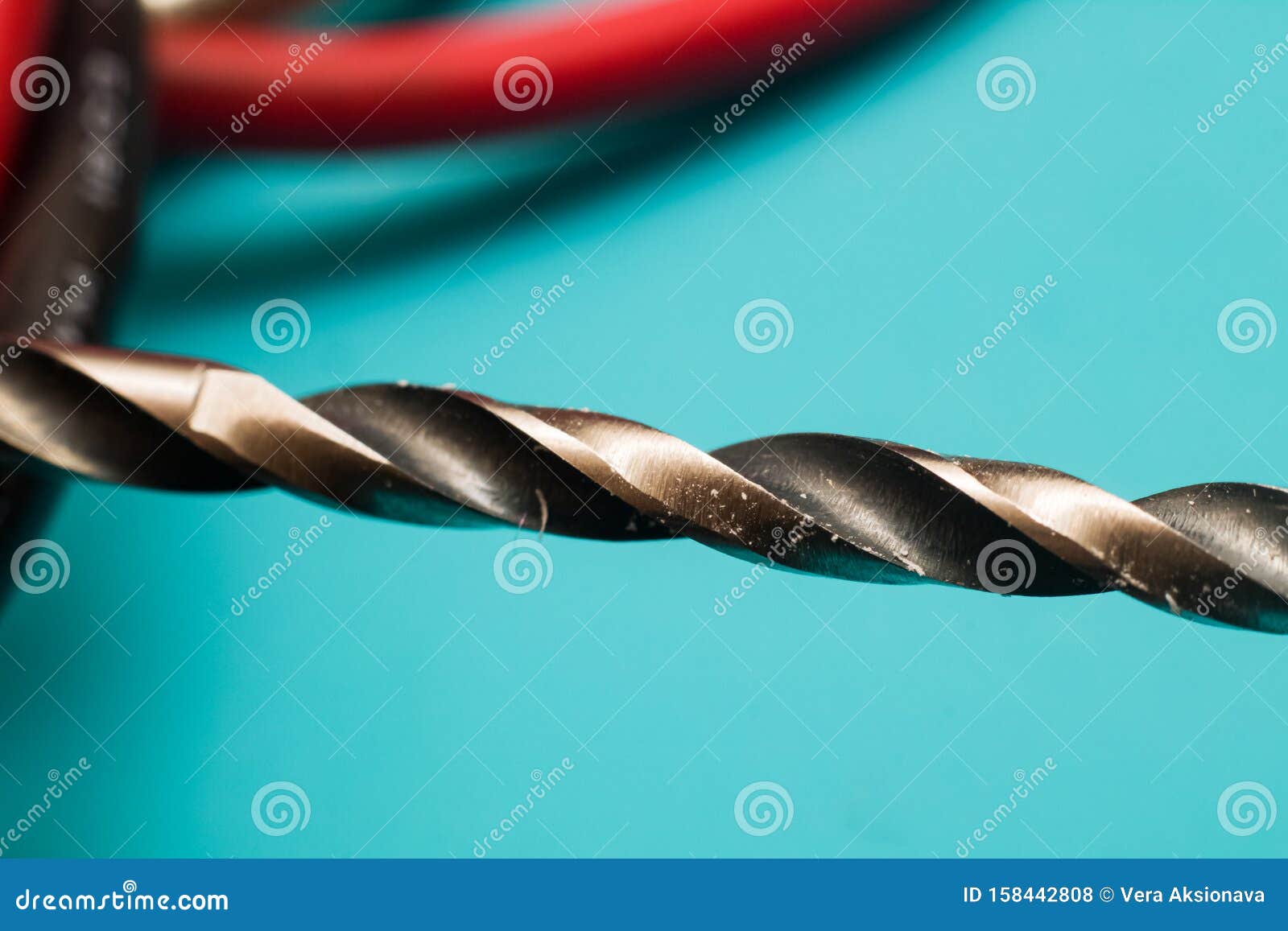 Drill Bit Close Up on Blue Background Stock Photo - Image of mechanical ...