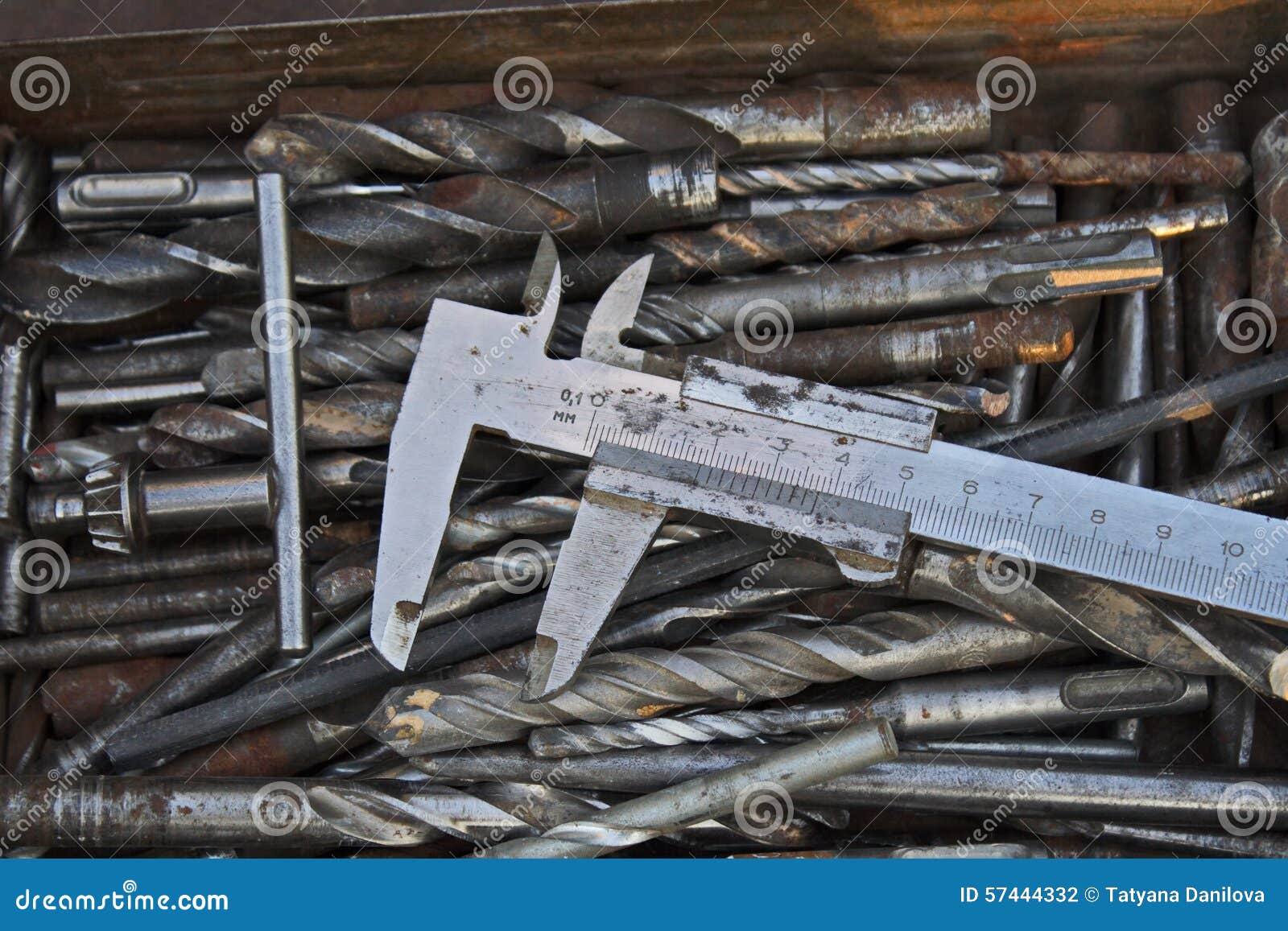 Drill and caliper stock photo. Image of tool, lathe, drills - 57444332