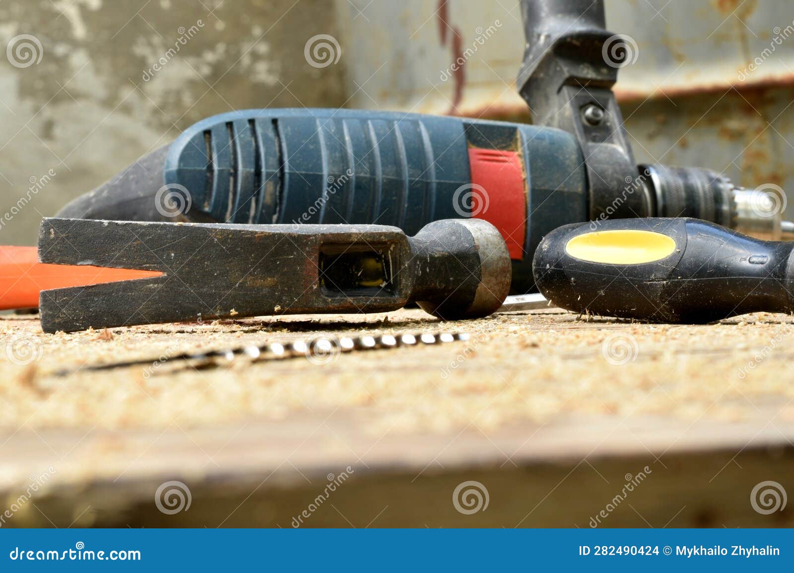 The Drill and Other Tools Were Left Lying on the Table. Stock Photo ...