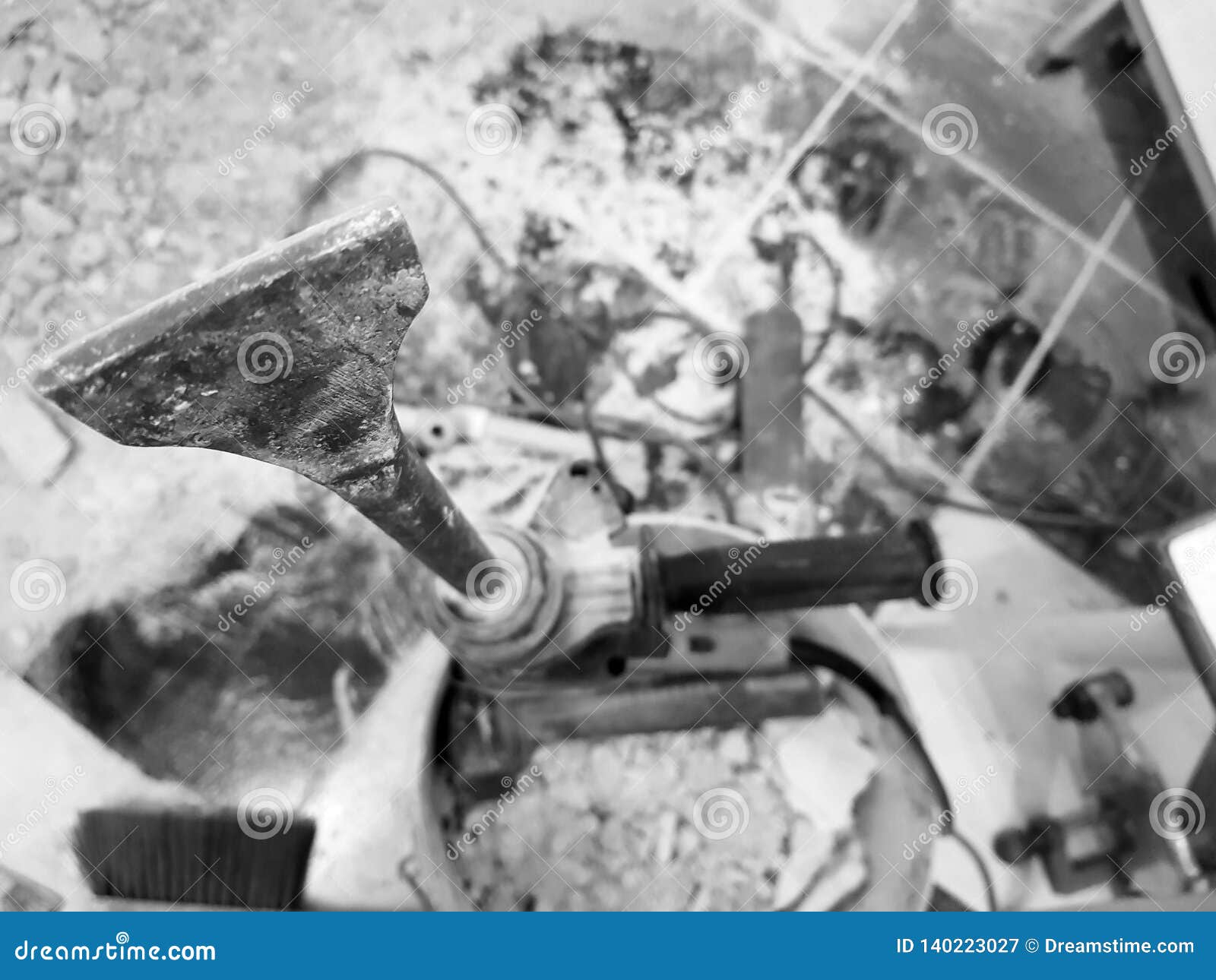 Drill from the Perforator, Chisel and Gates in the Brick Wall and ...