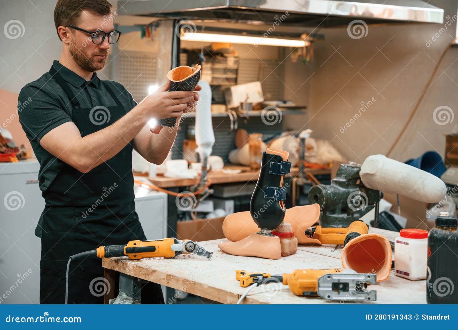 Raw Product for Prosthesis. Technician Working in Modern Laboratory ...