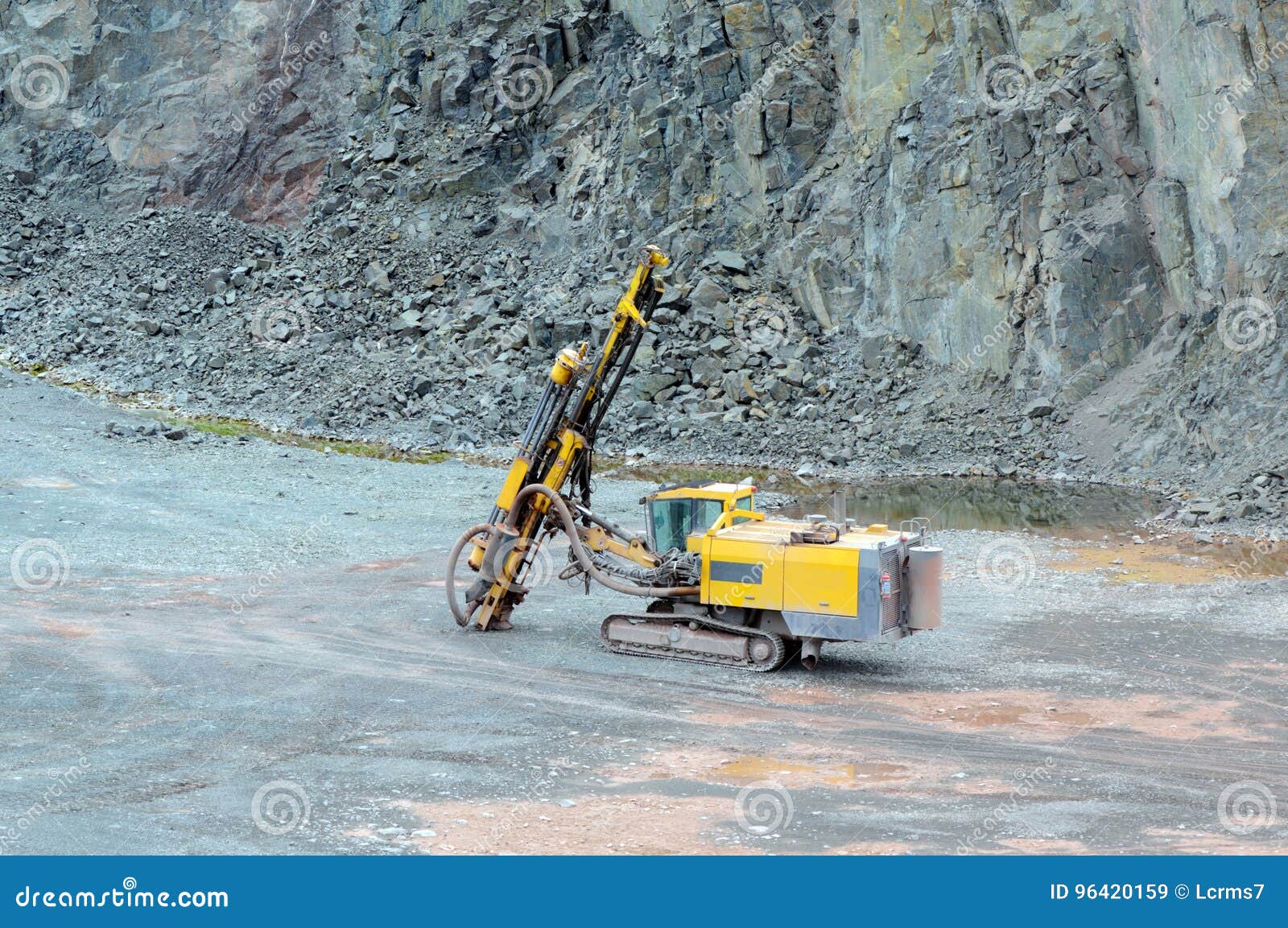 Quarry Mine Of Porphyry Rock. Earthmover Bulldozer Driving Around ...